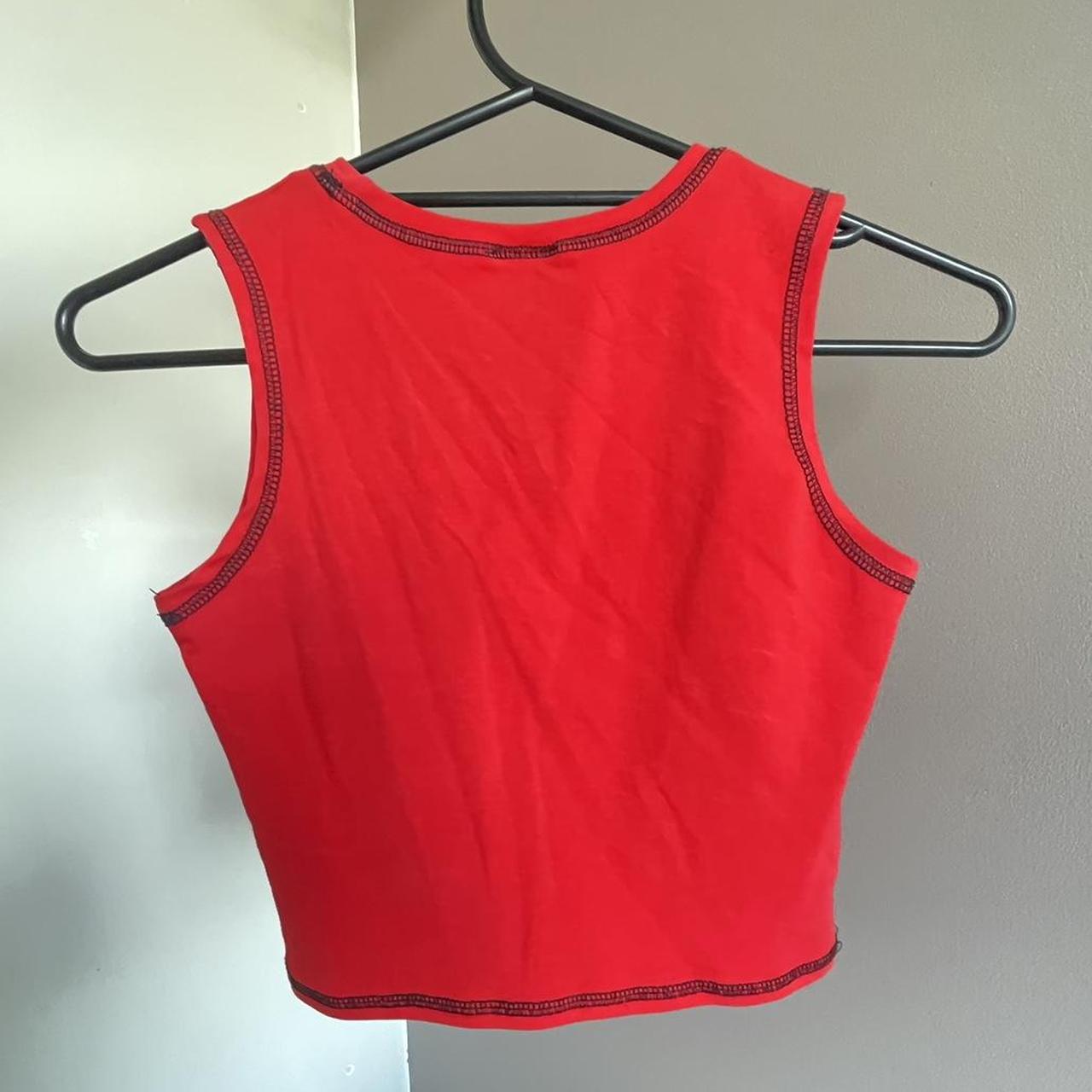 Cheep store red cropped tank top with cute flower... - Depop