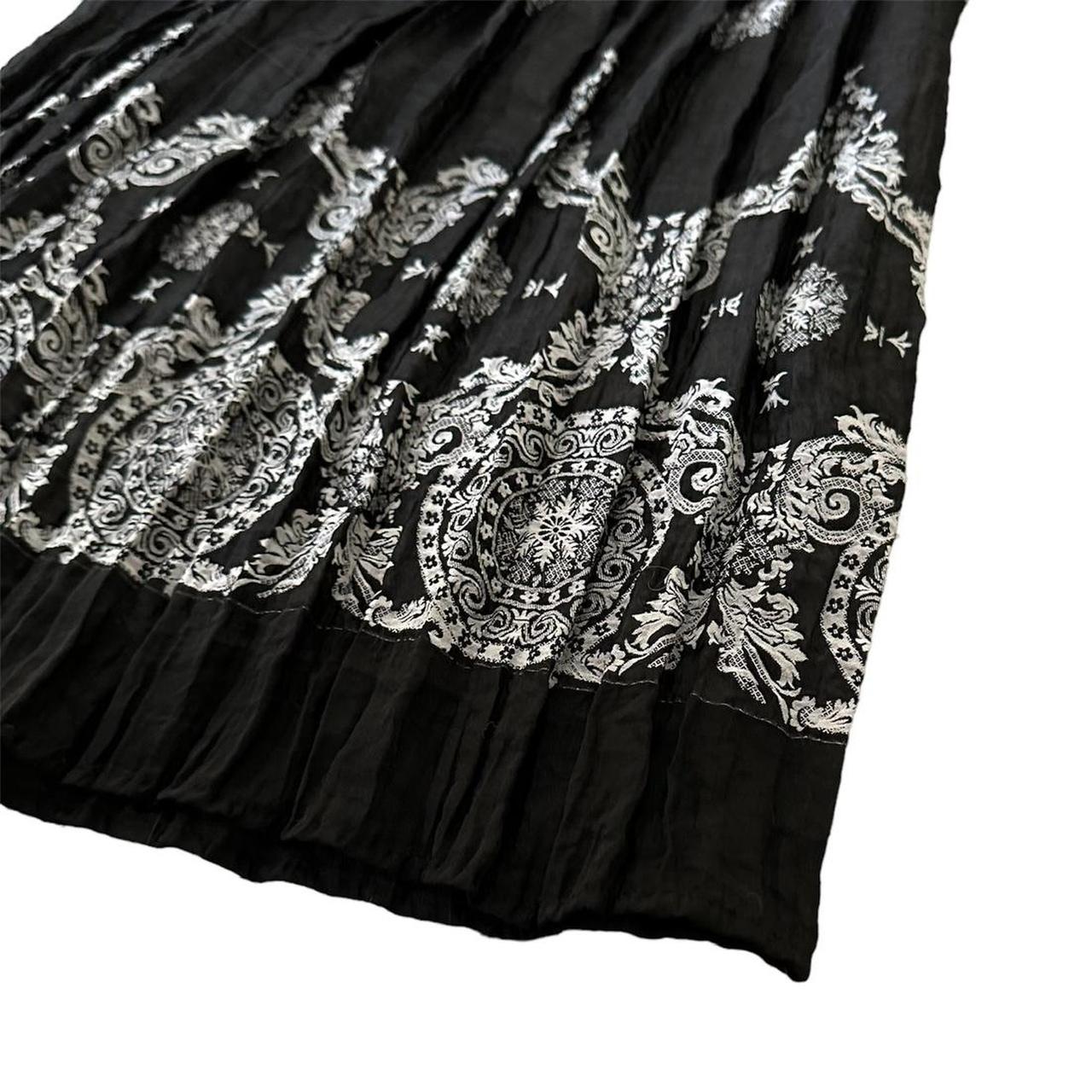 black vintage dress with white floral designs 2... - Depop