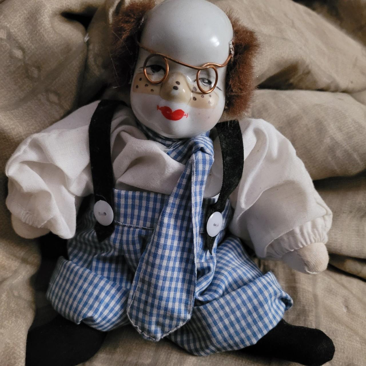 Haunted porcelain sandbag clown doll from my dad's... | Depop