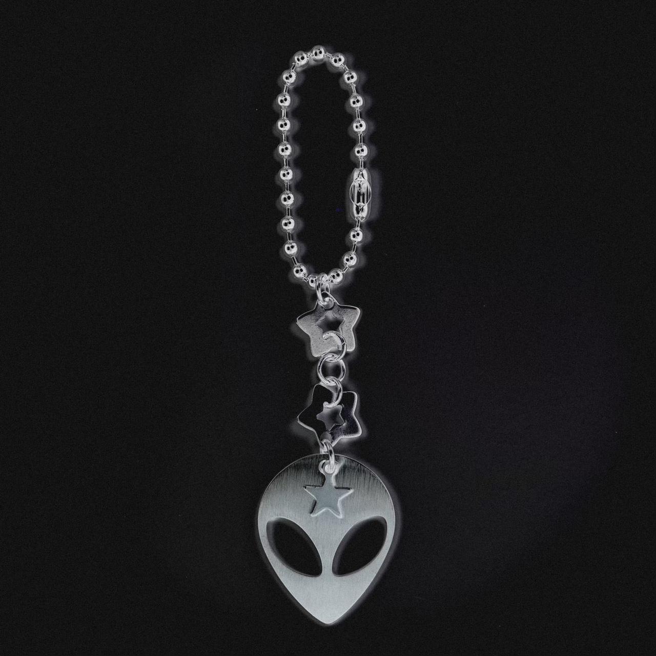 MANIAC Alien silver Keychain #alien #space... - Depop
