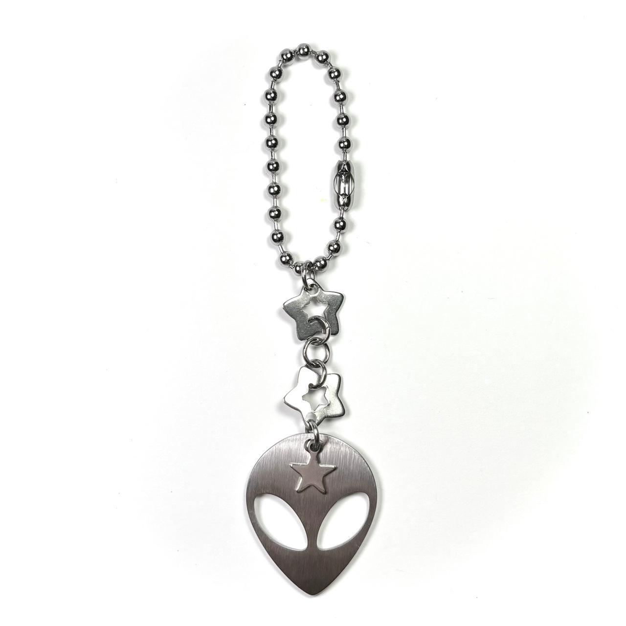 MANIAC Alien silver Keychain #alien #space... - Depop