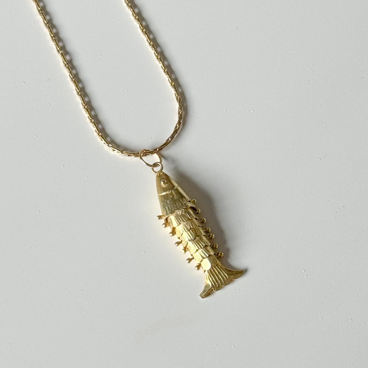 Unique Gold Plated Articulated Fish Pendant... - Depop