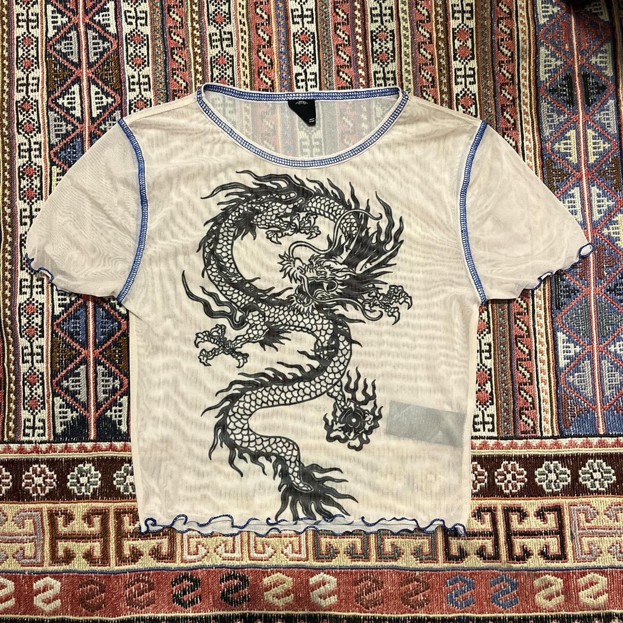 Sheer skin coloured top with dragon pattern and blue... - Depop
