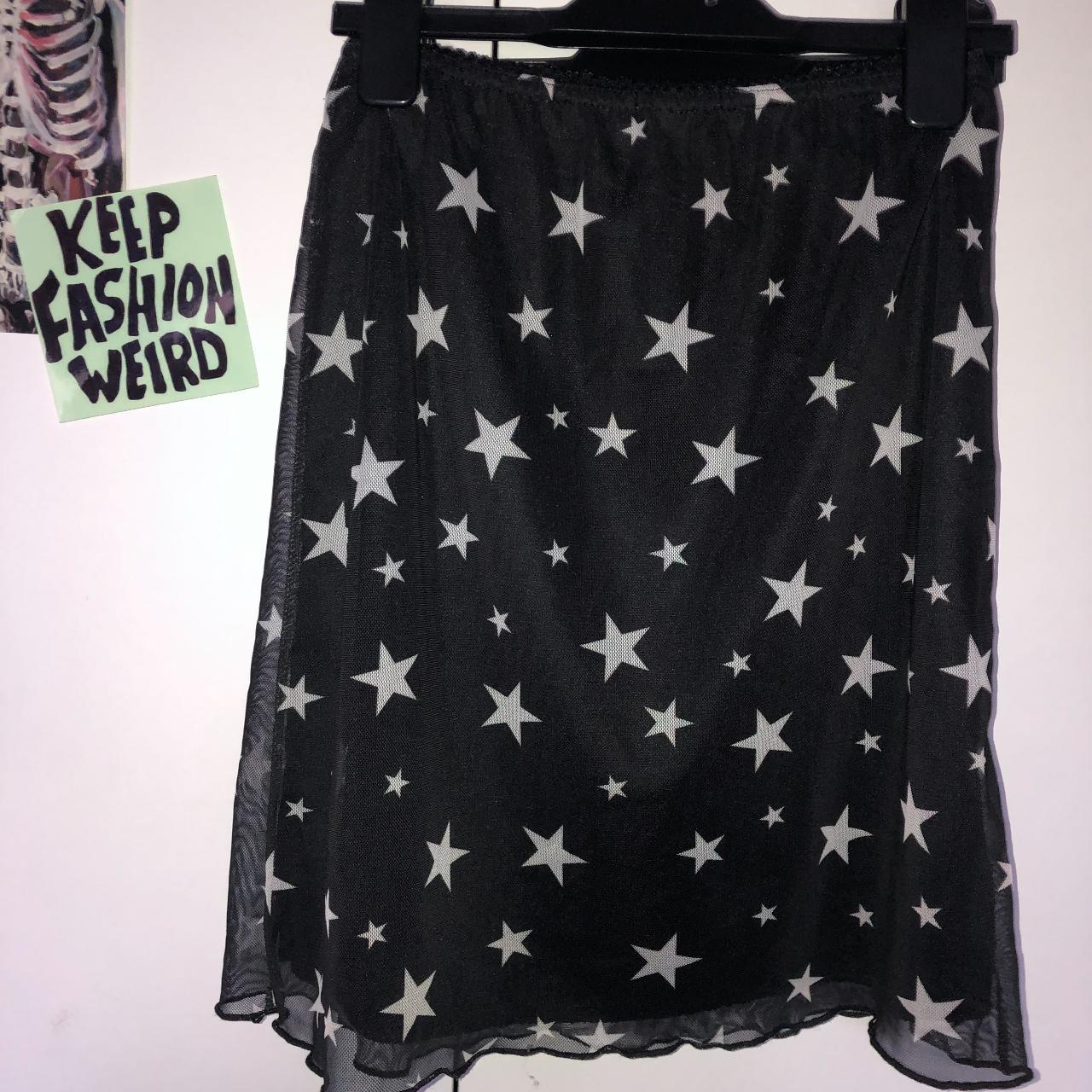 Nasty Gal gothic starry mini skirt. Made of a mesh... - Depop