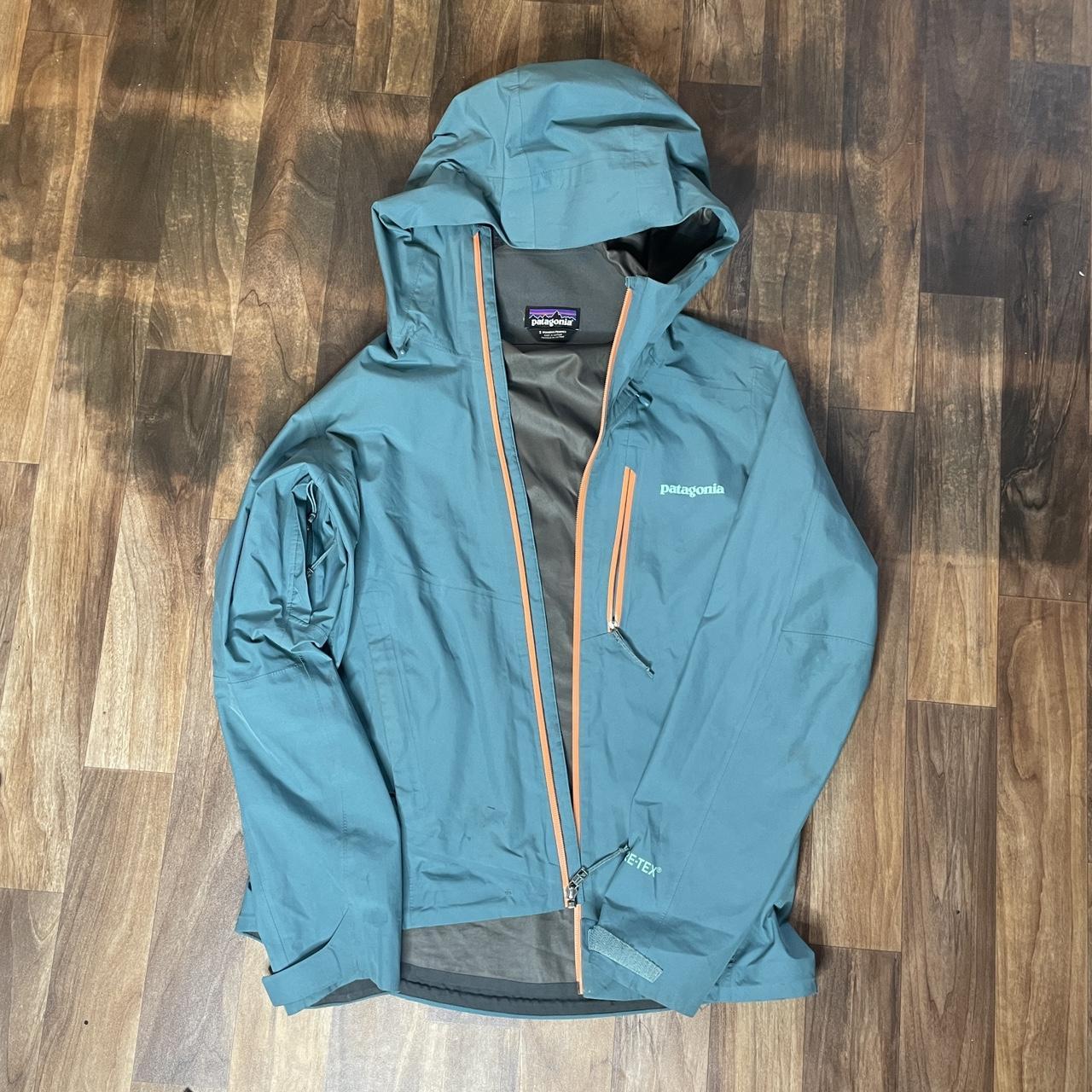 Patagonia rain jacket, 3 zipper pockets and armpit... - Depop