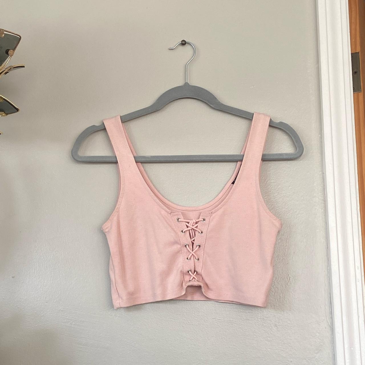 Light pink cropped tank top w/ lace up front - Depop