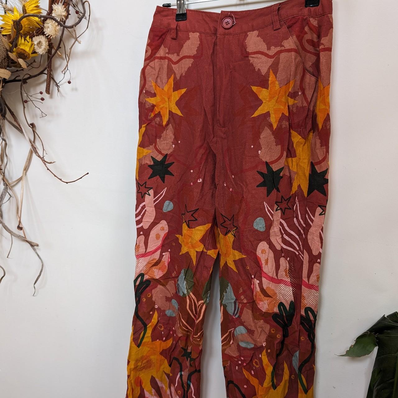 Dangerfield red fire print flare pants. never worn!... - Depop