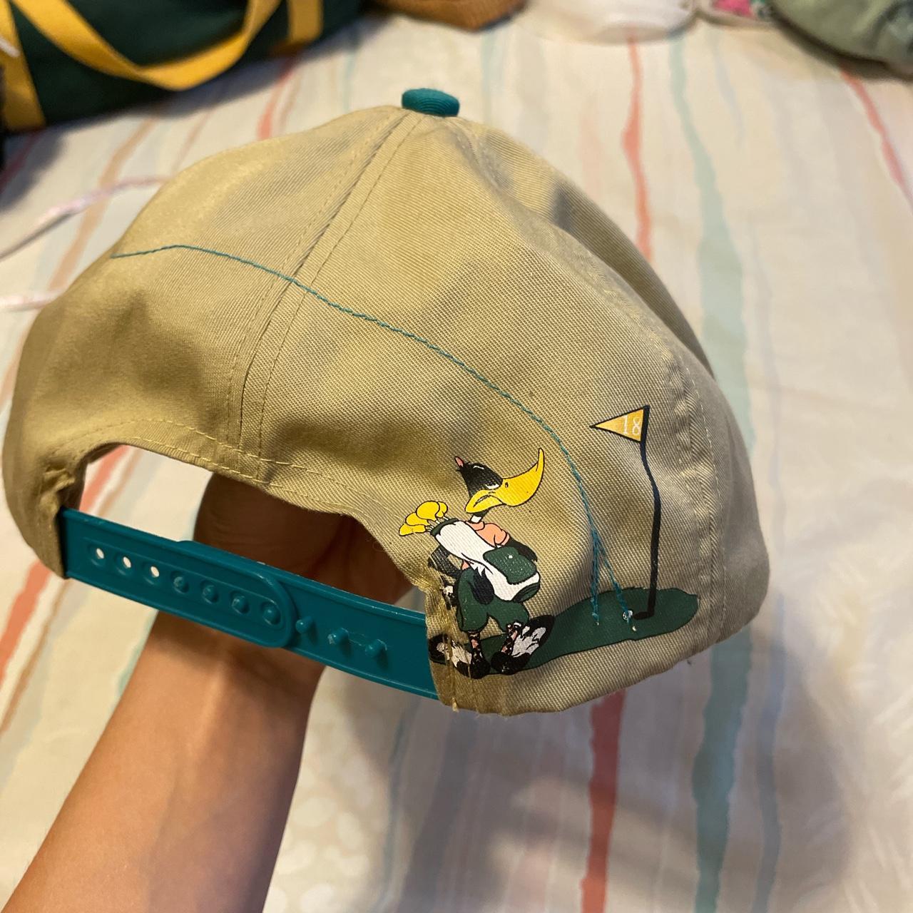 Looney Tunes Golf hat with green brim and khaki... - Depop