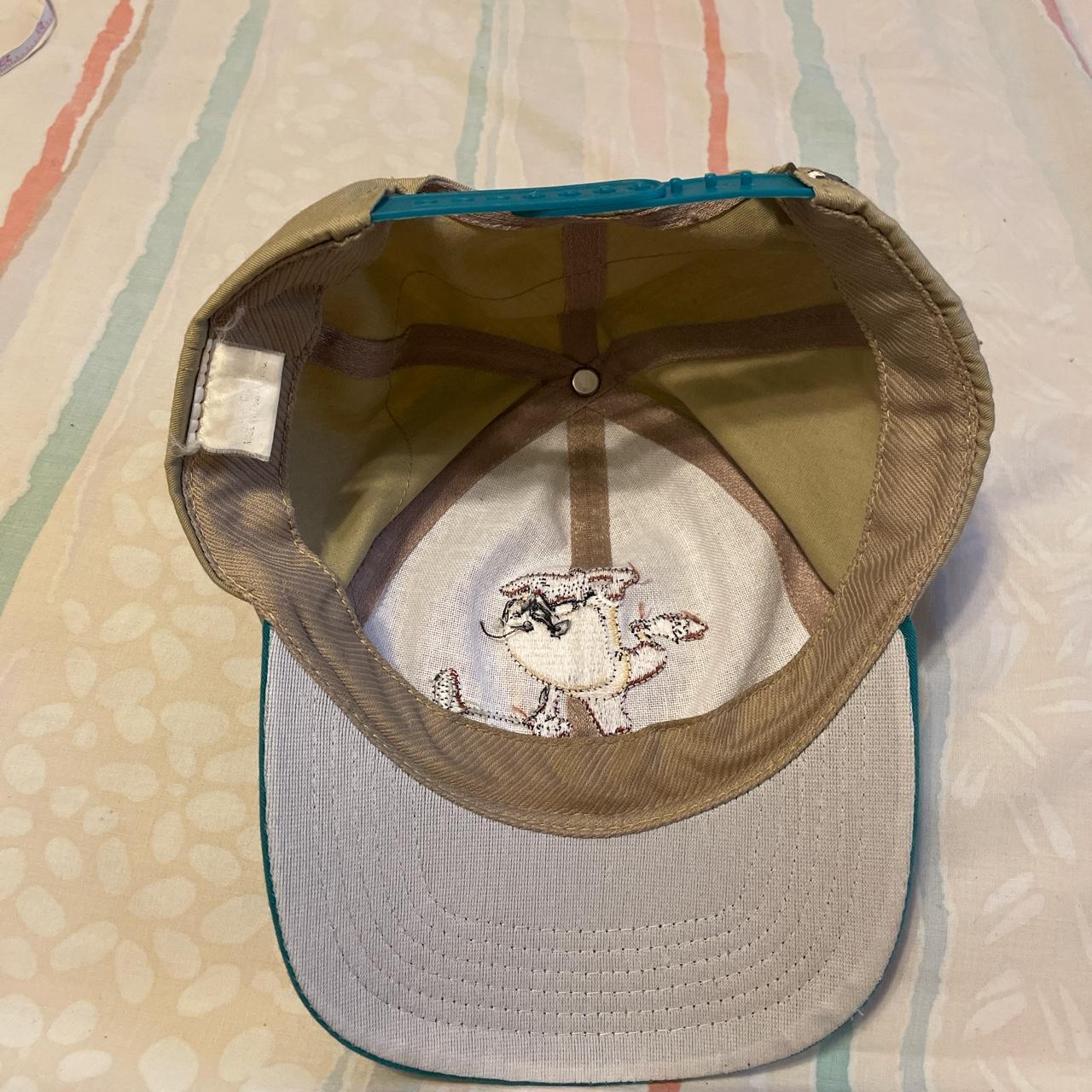 Looney Tunes Golf hat with green brim and khaki... - Depop