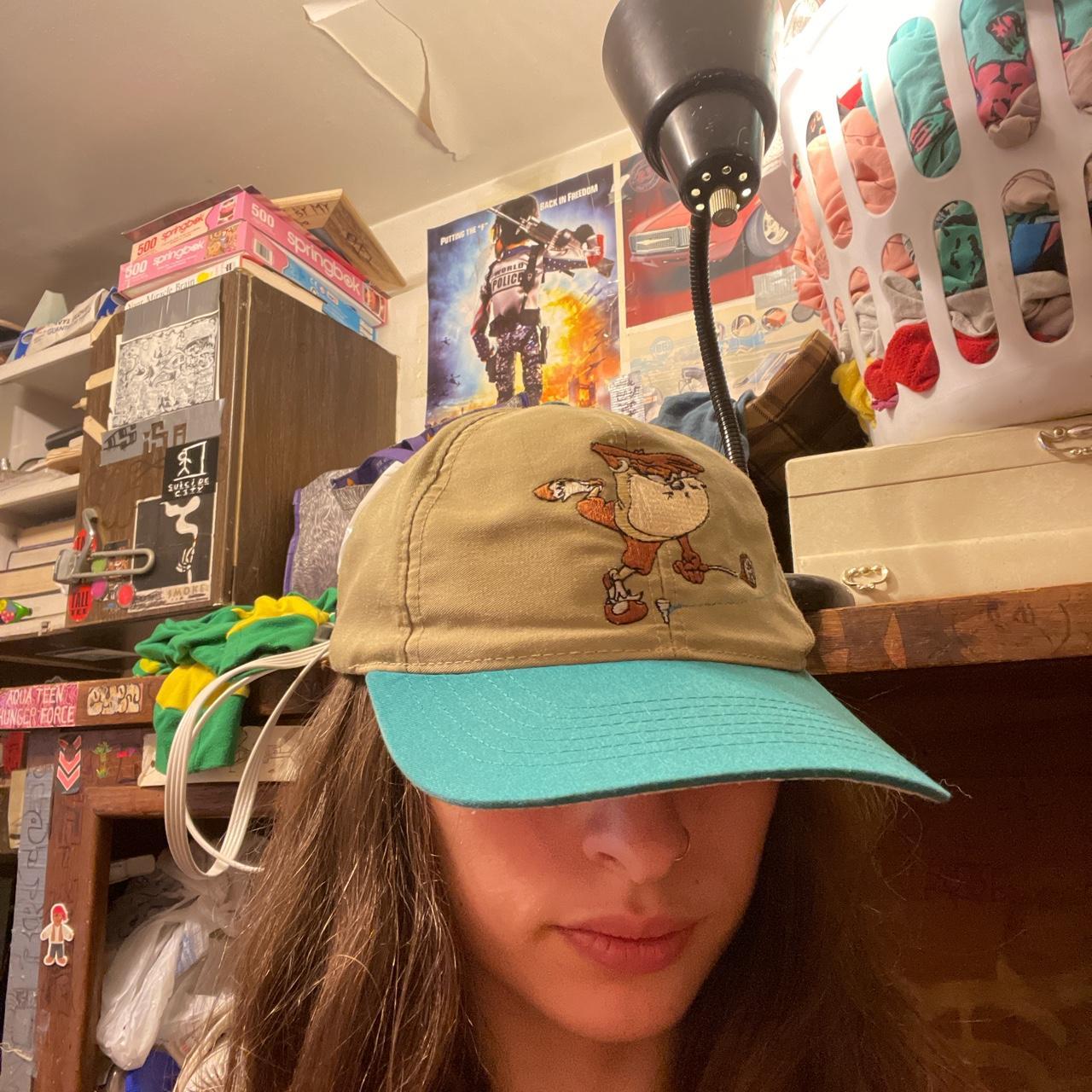 Looney Tunes Golf hat with green brim and khaki... - Depop