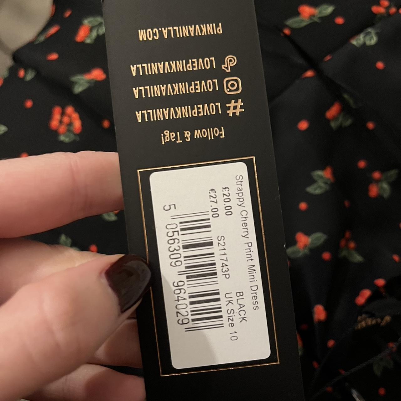 Black cherry print mini dress with cut out never... - Depop