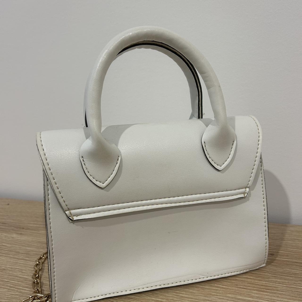 Insert Cash Here white hand bag used only a handful... - Depop