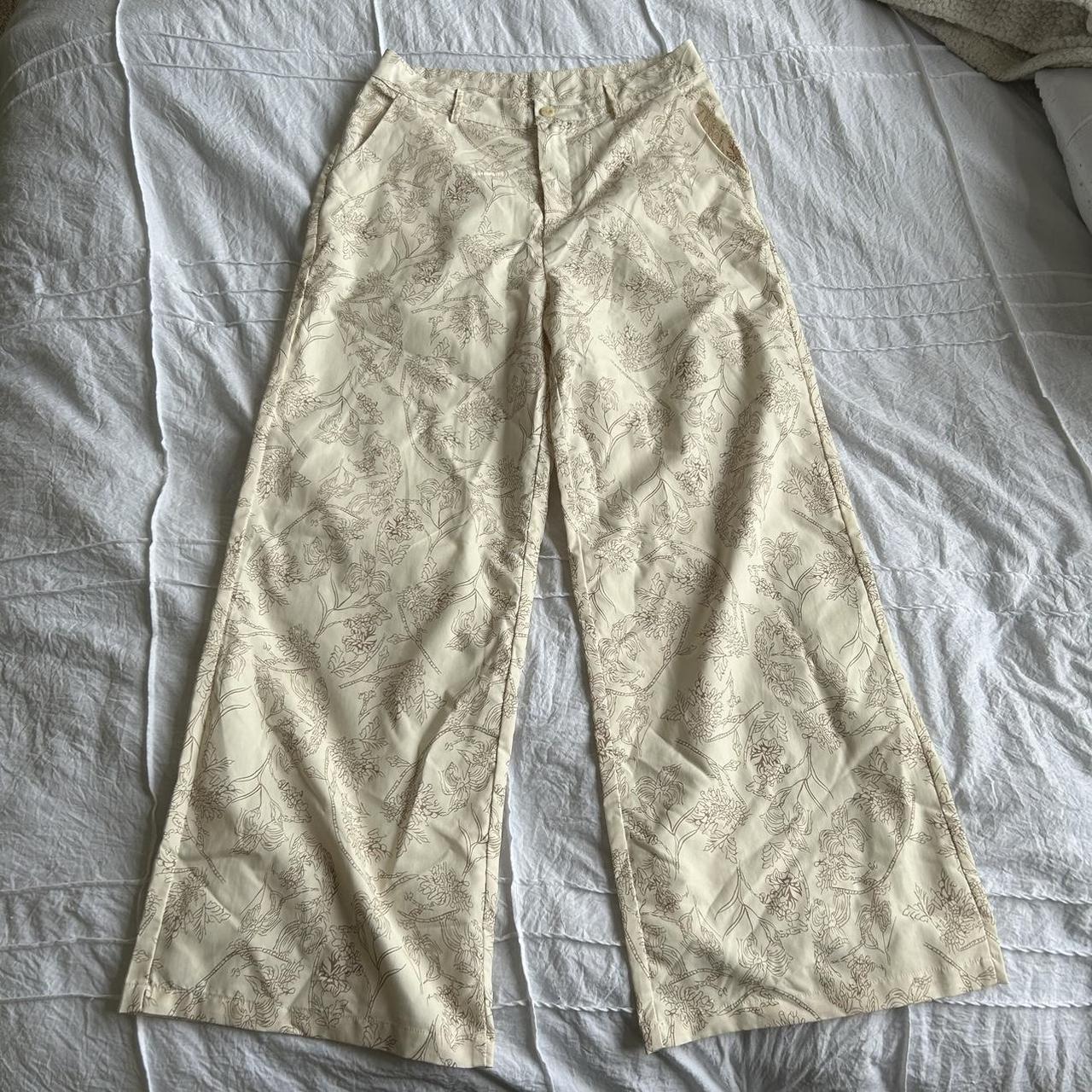 Neutral print flare pants brand is cider ~ fits a... - Depop