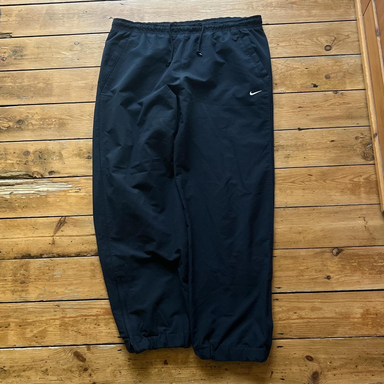 Super sick vintage baggy Nike shell joggers in a... - Depop