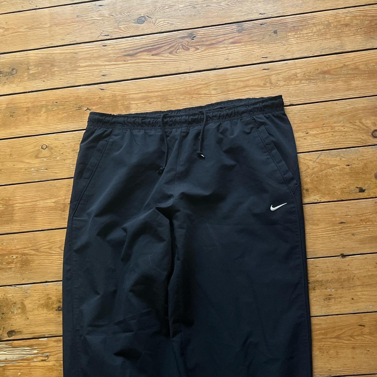 Super sick vintage baggy Nike shell joggers in a... - Depop