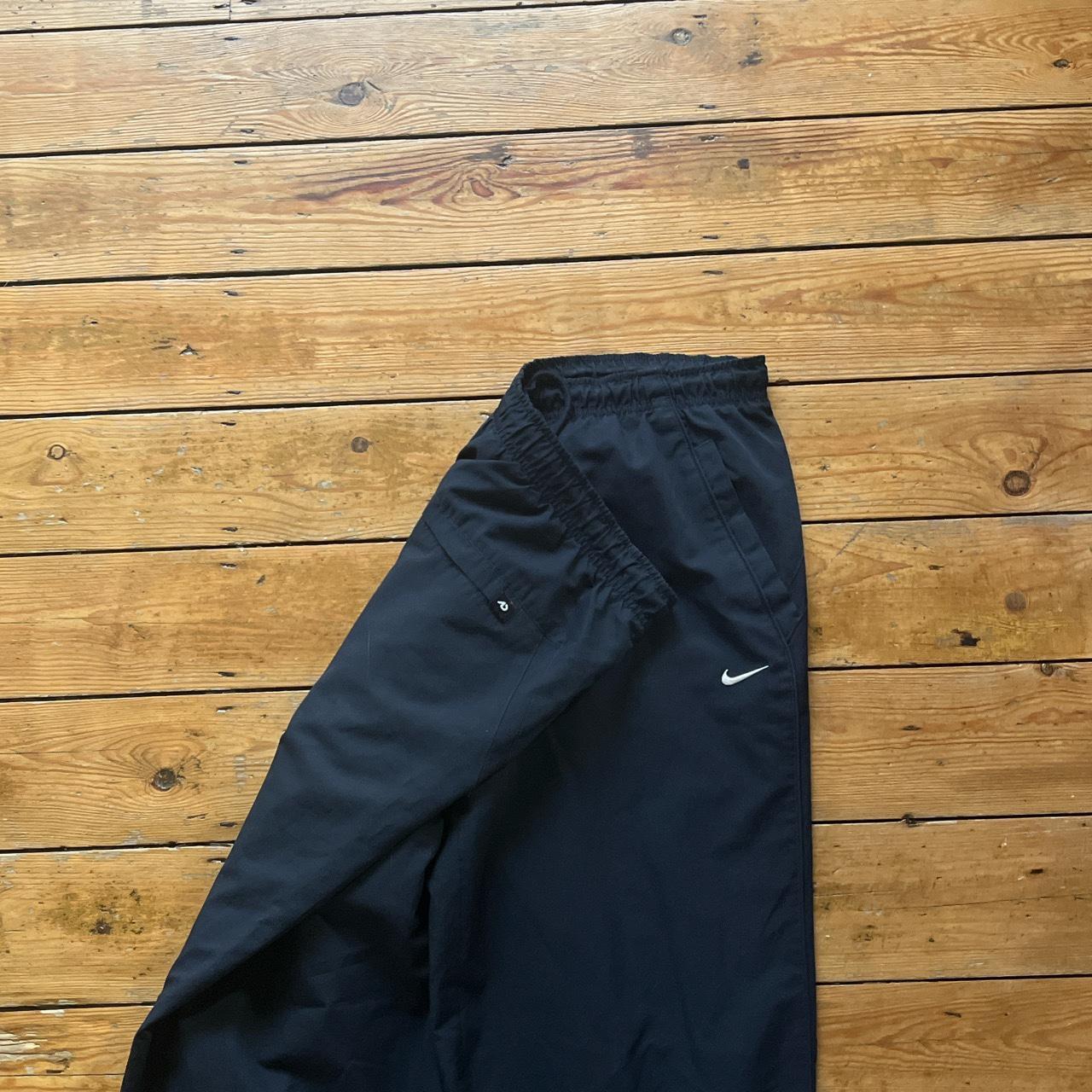 Super sick vintage baggy Nike shell joggers in a... - Depop