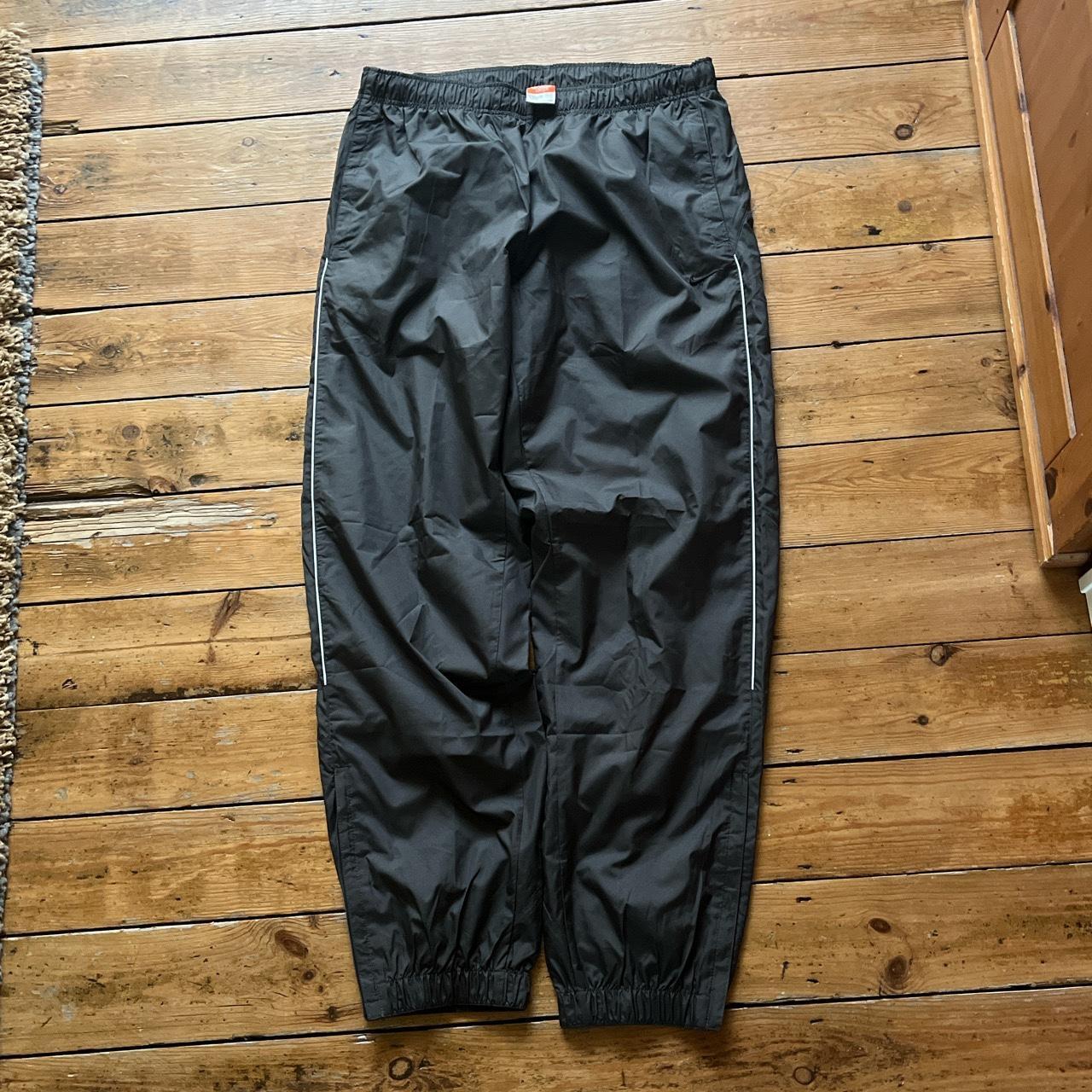 Super sick vintage baggy Nike shell joggers in a... - Depop