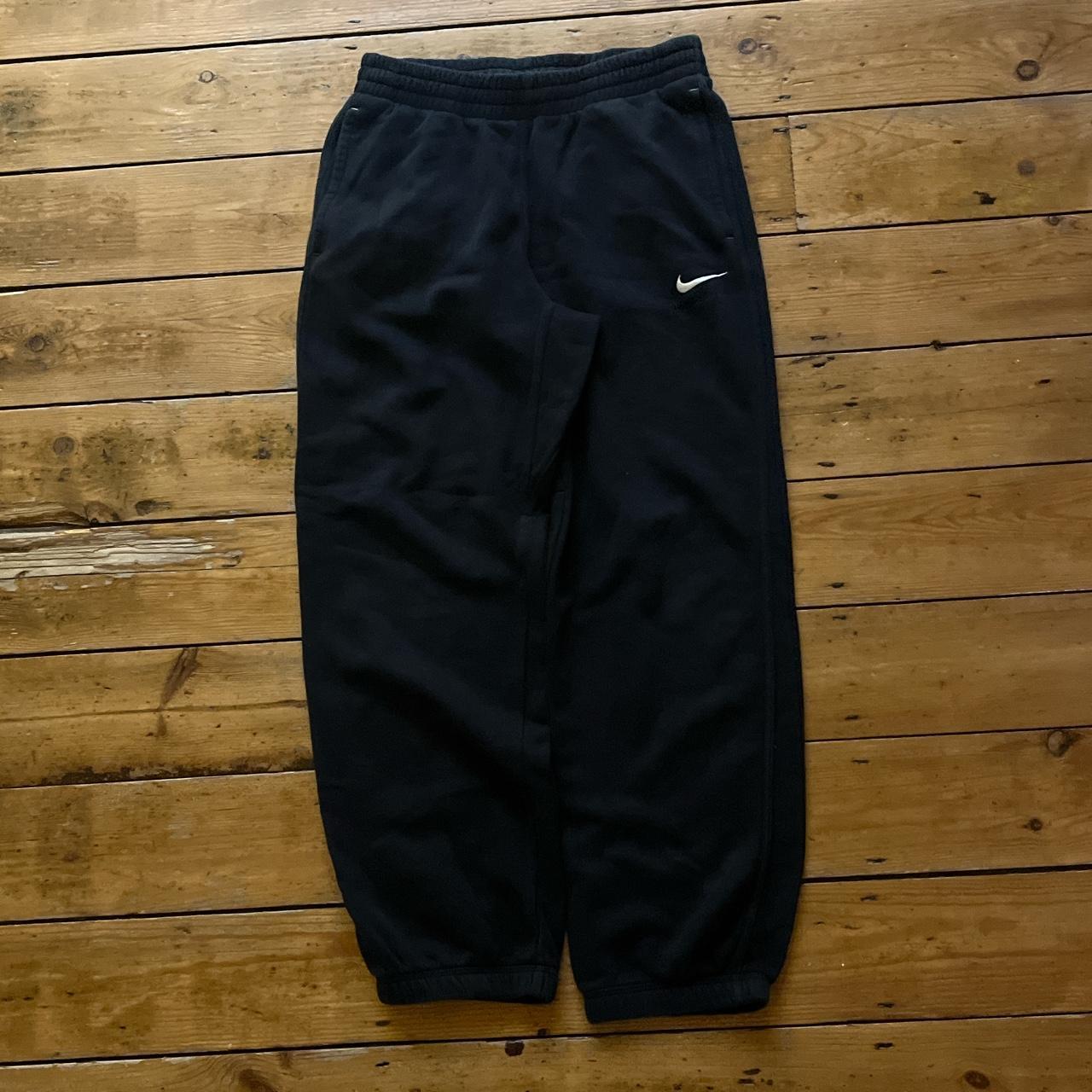 Super sick vintage baggy Nike joggers in a midnight... - Depop