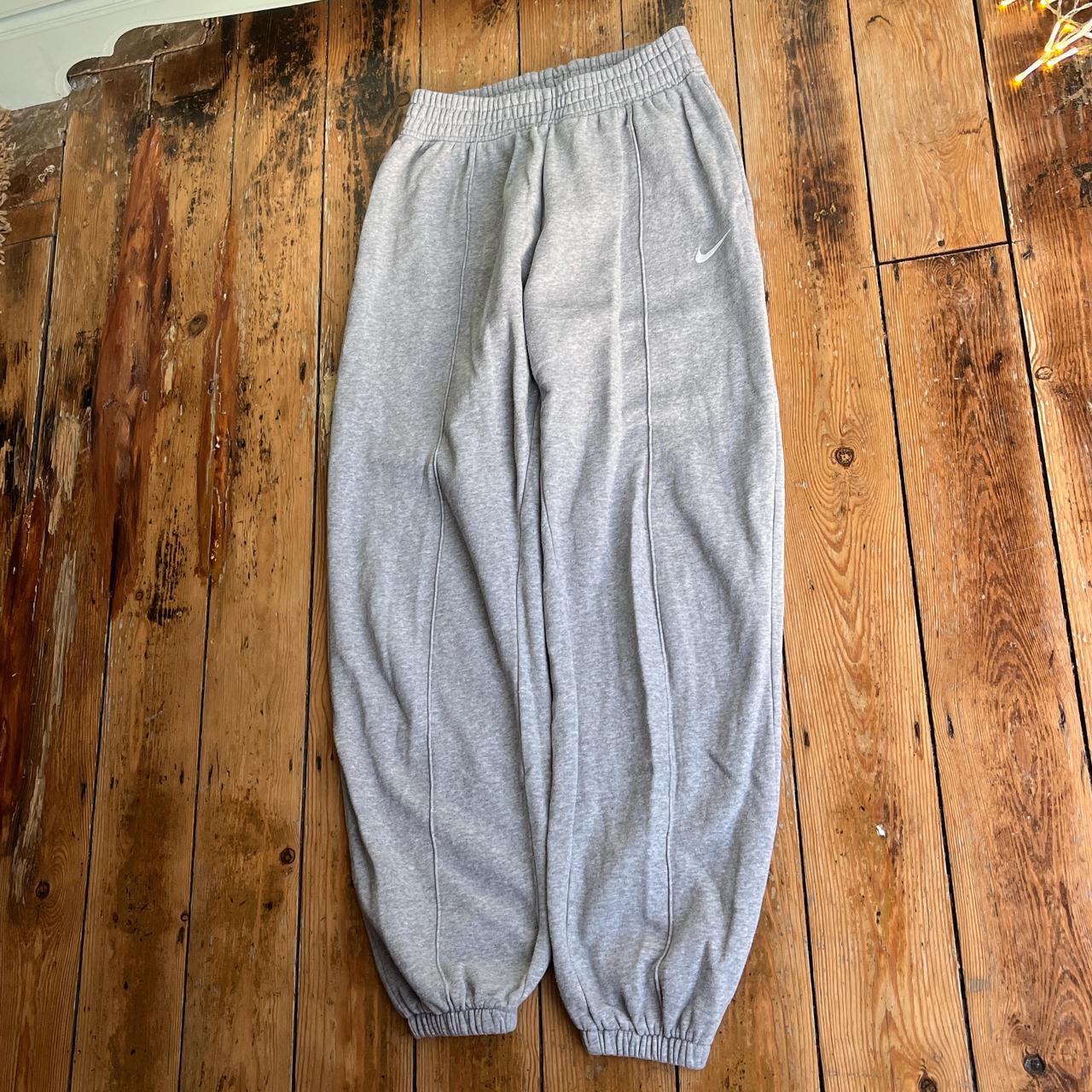 Super sick baggy Nike joggers in grey with a white... - Depop