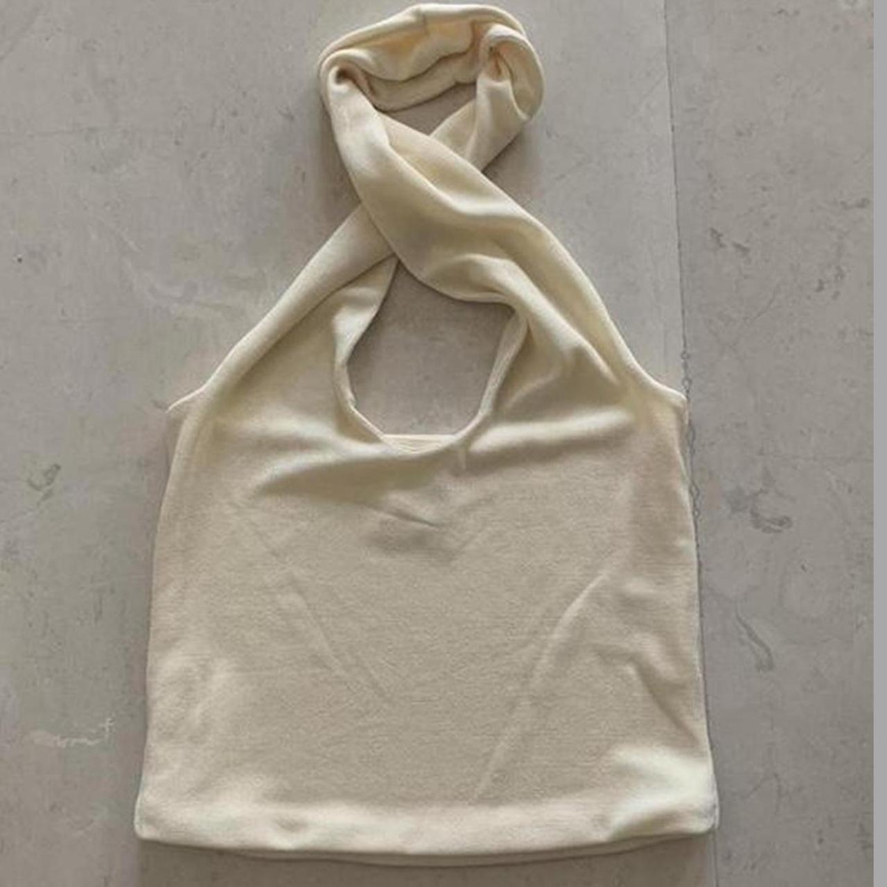 With Jean Erin halter top in buttercream (pale... - Depop
