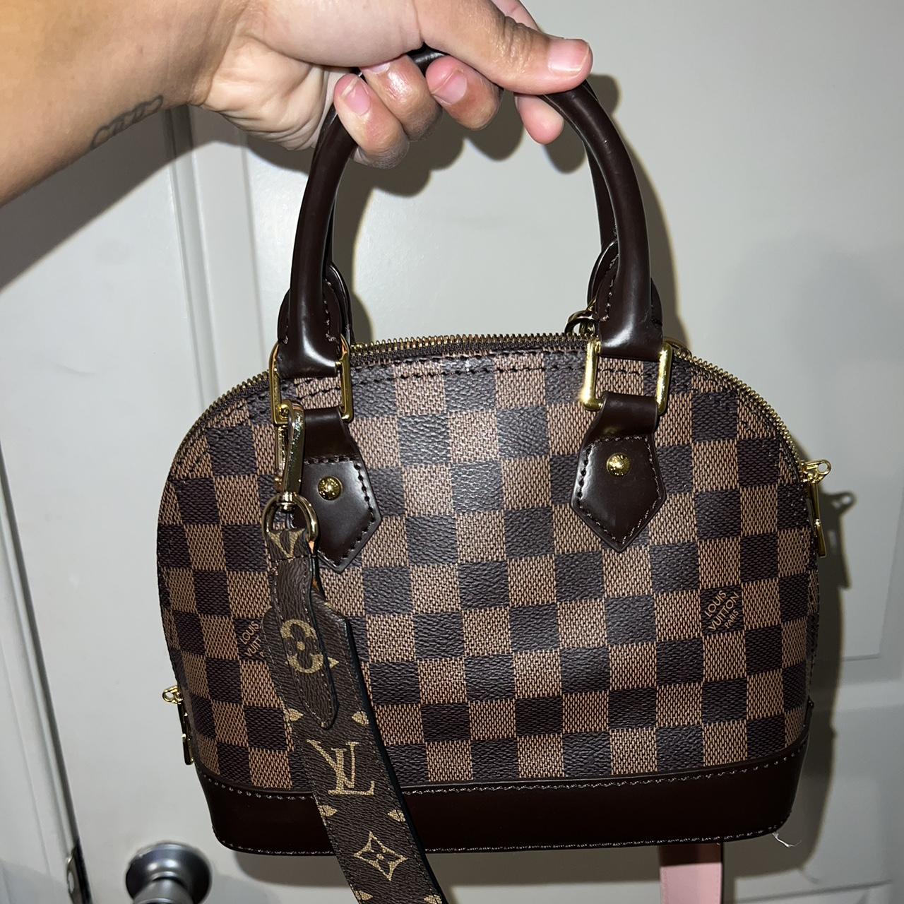 LV Handheld Purse Comes with original thin strap... - Depop