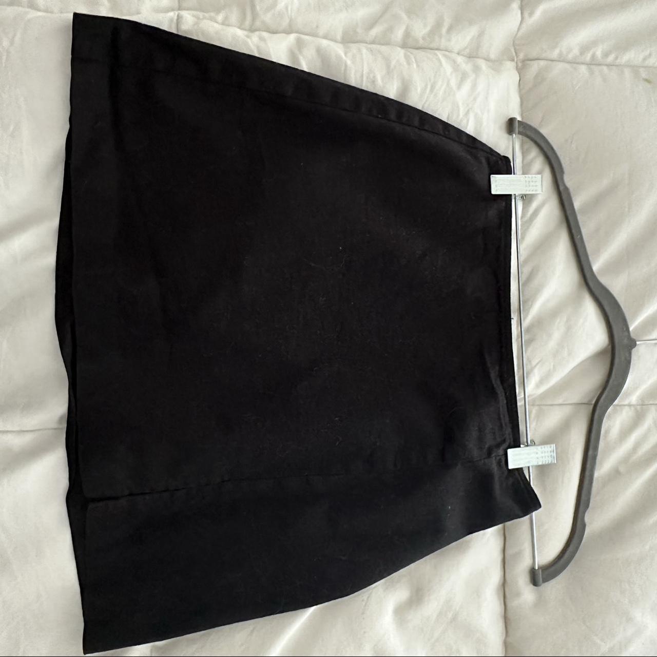 Vintage basic black mini skirt with small slit on... - Depop