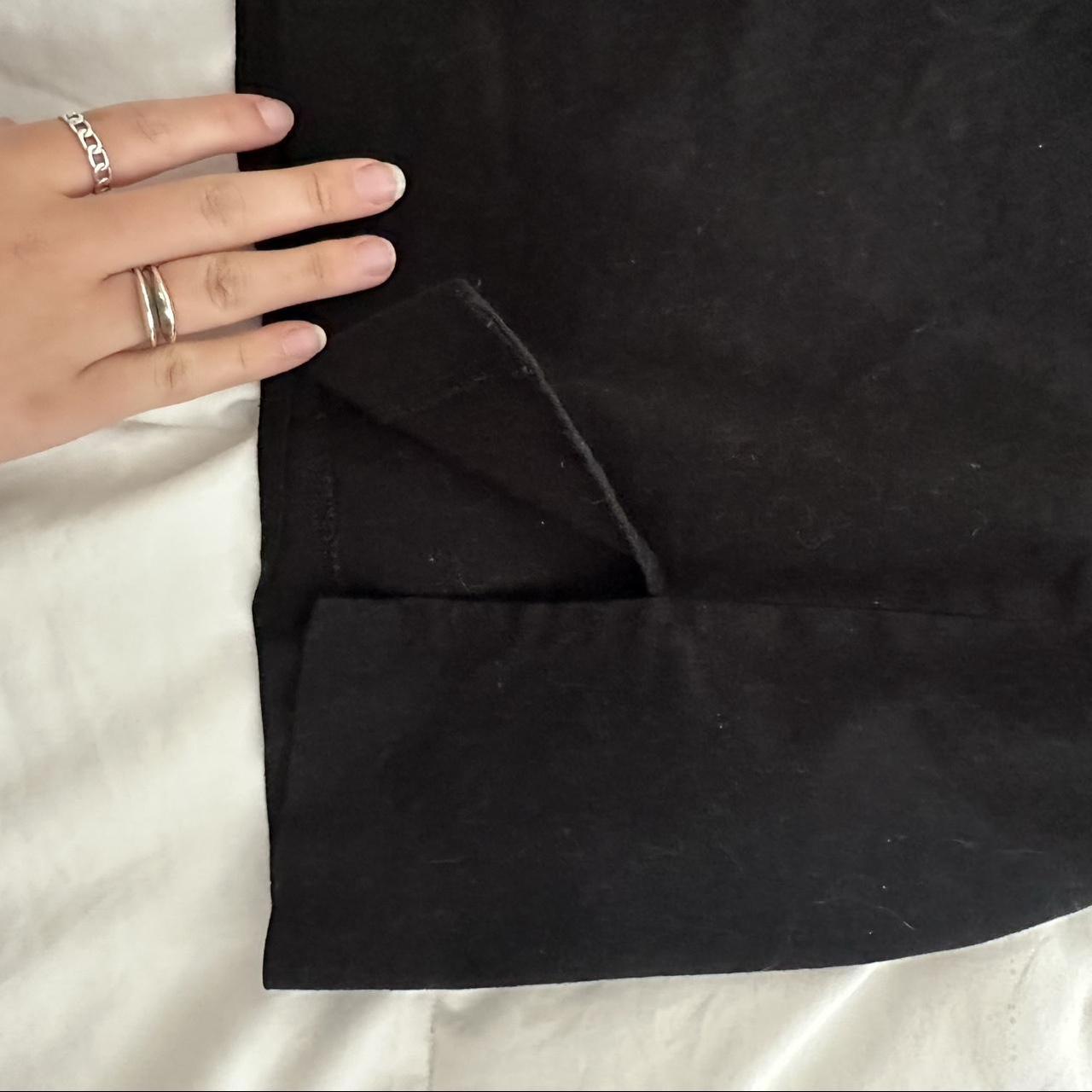 Vintage basic black mini skirt with small slit on... - Depop