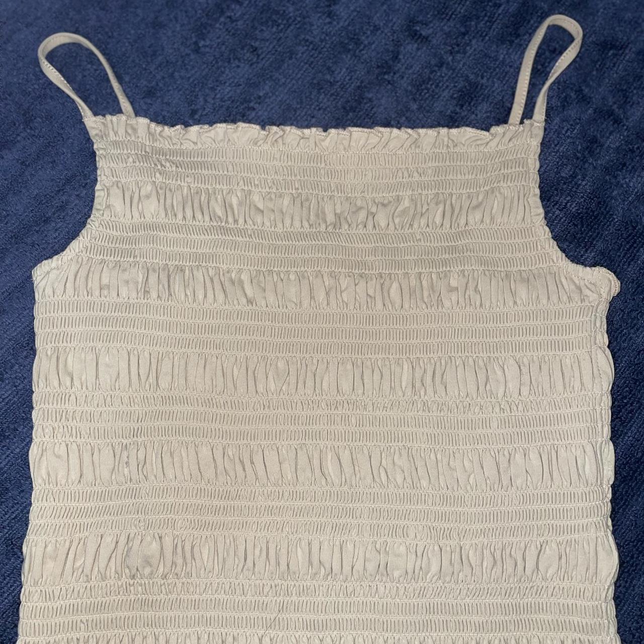 Tan scrunch top never worn - Depop