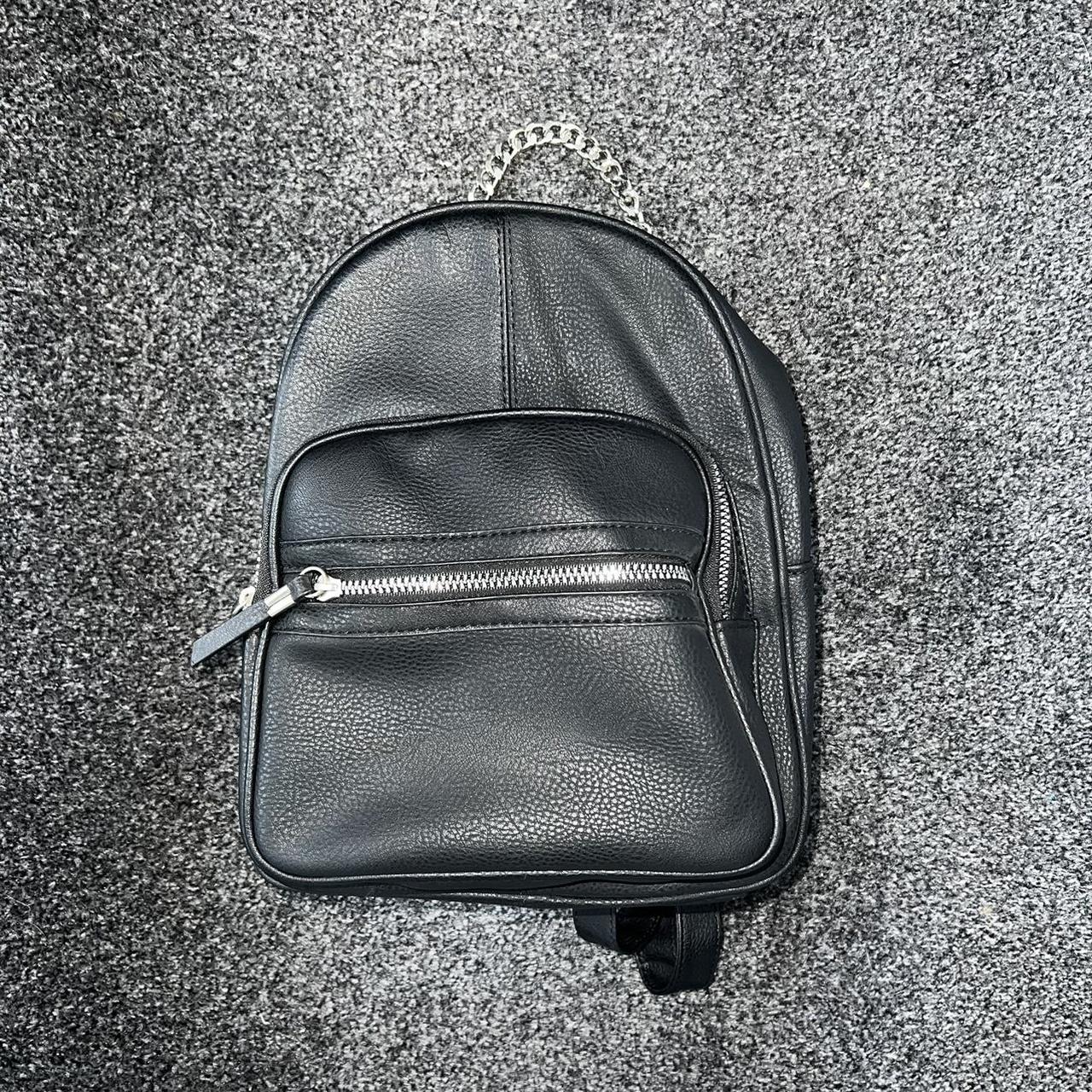 Primark black leather backpack with silver chain... - Depop