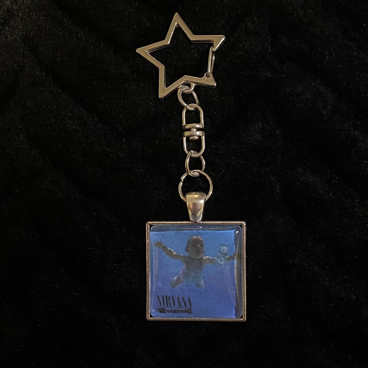 nirvana keychain 3 1/2” long save on shipping when... - Depop
