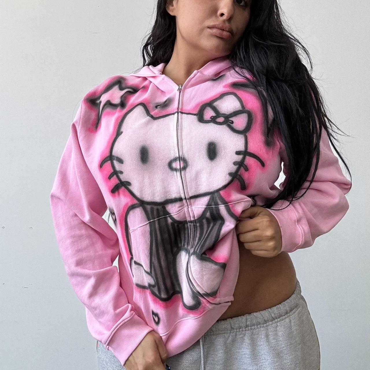 Hello kitty spray paint zip up hoodie Size large... - Depop