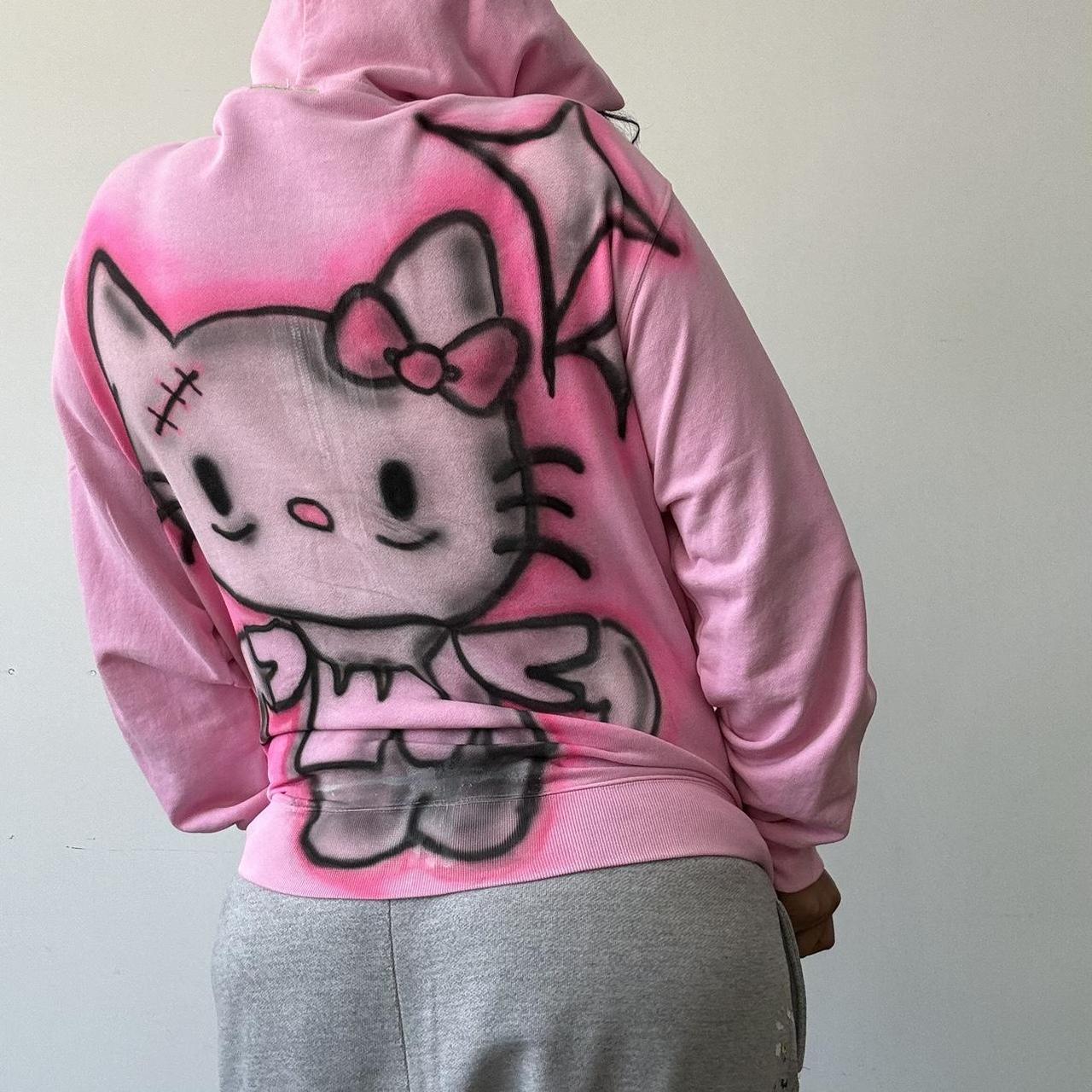 Hello kitty spray paint zip up hoodie Size large... - Depop