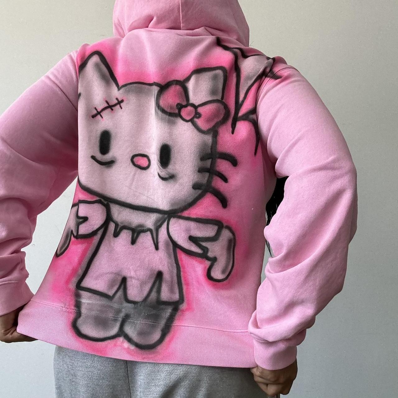 Hello kitty spray paint zip up hoodie Size large... - Depop