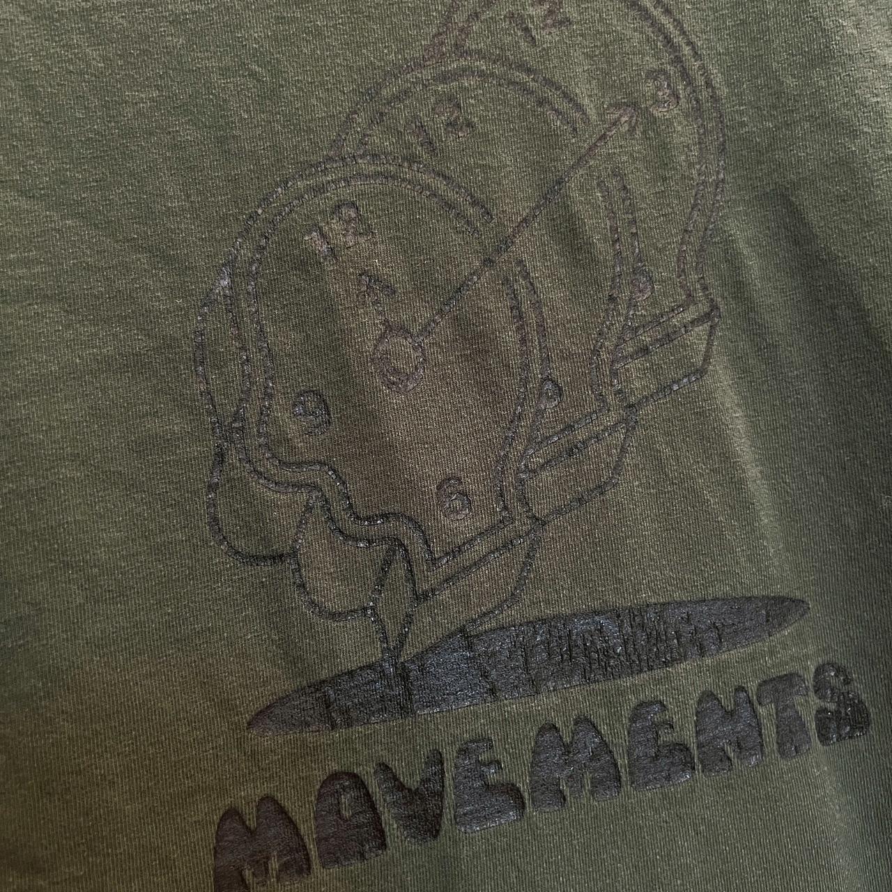 Movements band T-shirt, size medium but fits large... - Depop