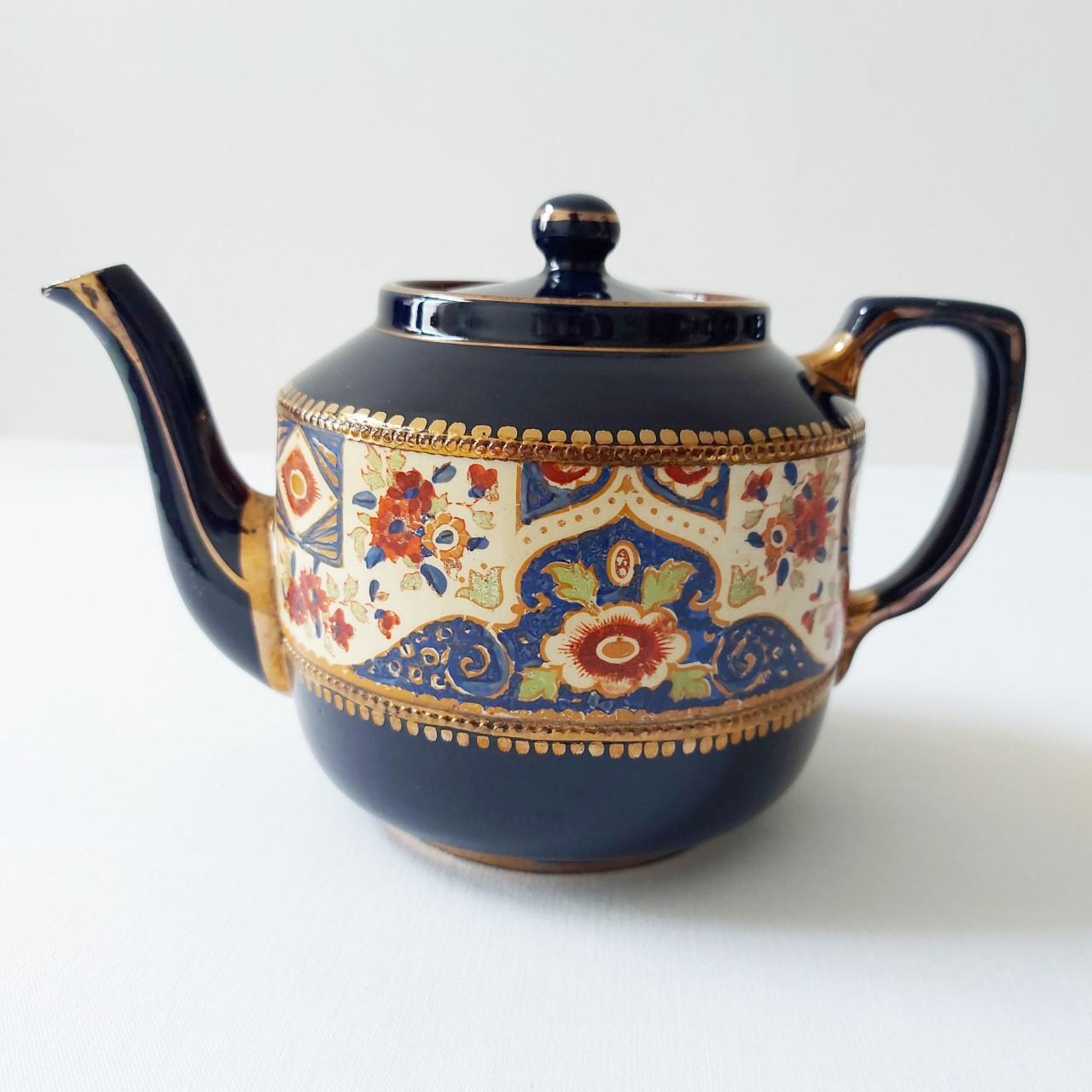 Rich navy blue glazed teapot with golden trims and... - Depop