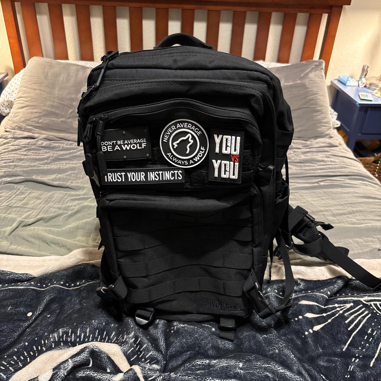 Black and white 45l Wolfpak backpack with multiple... | Depop