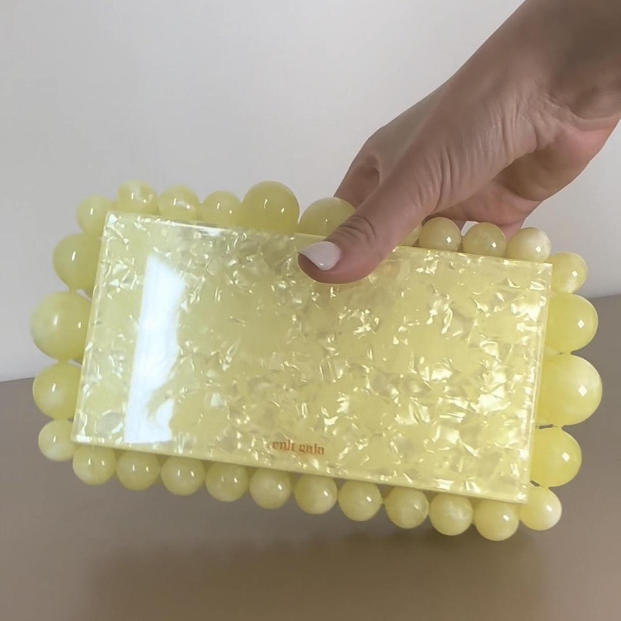 cult gaia lemon yellow EOS pearl clutch used once... - Depop