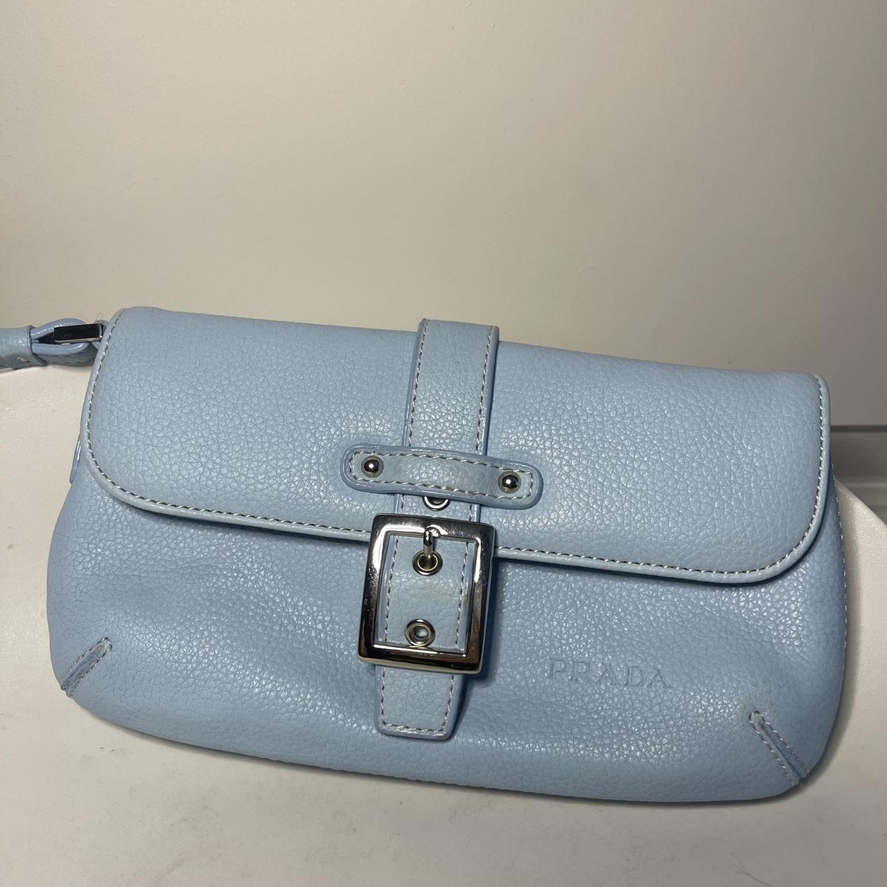 Faux Prada baby blue wristlet brand new and has... - Depop