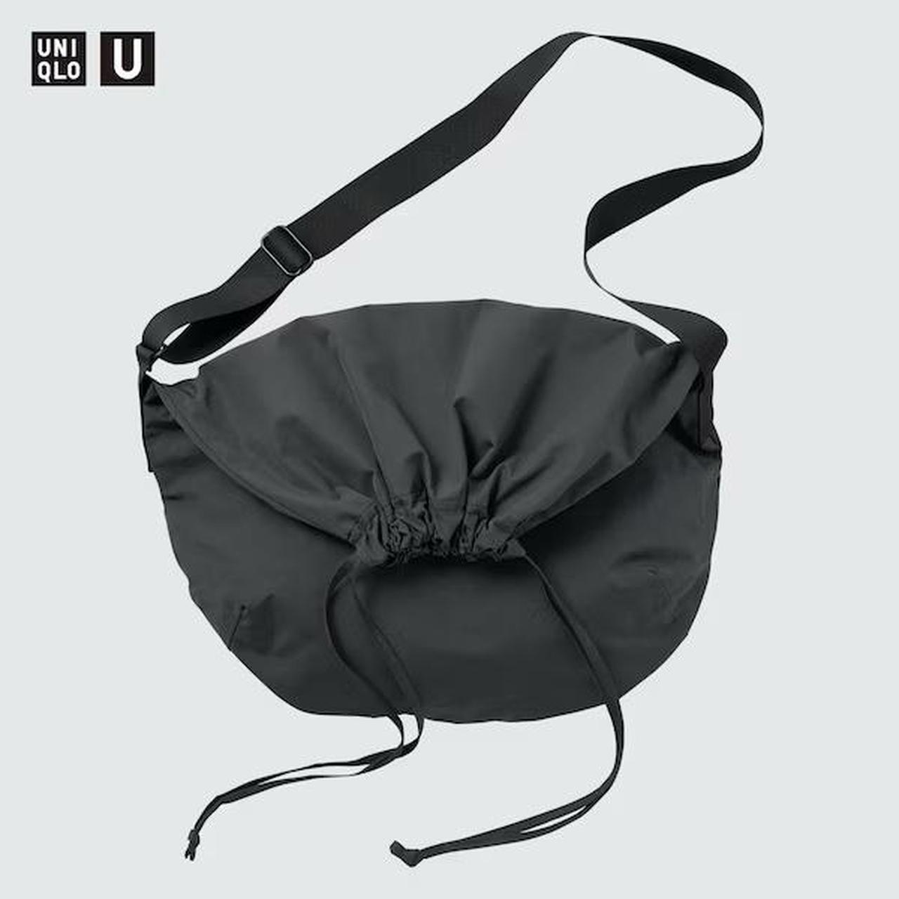 Uniqlo Drawstring Bag Black worn a few times,... - Depop