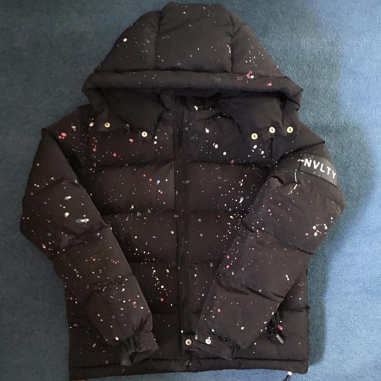 NVLTY black puffer coat, with paint design Great... - Depop