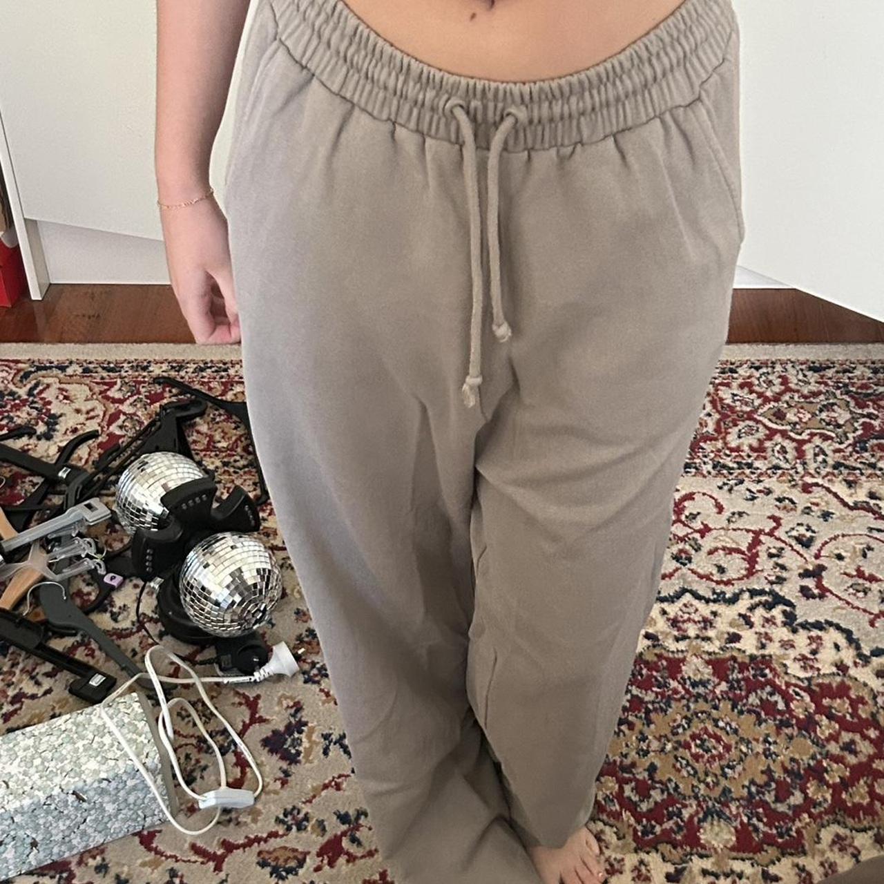 Comfy oversized grey trackies with straight line... - Depop