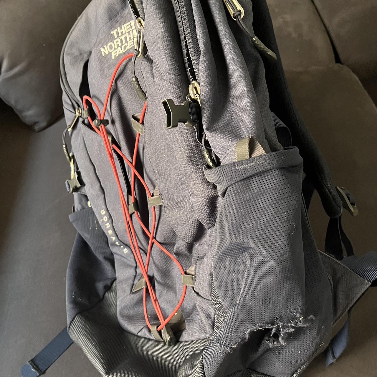 rustic navy blue North Face backpack. 3 pockets with... - Depop