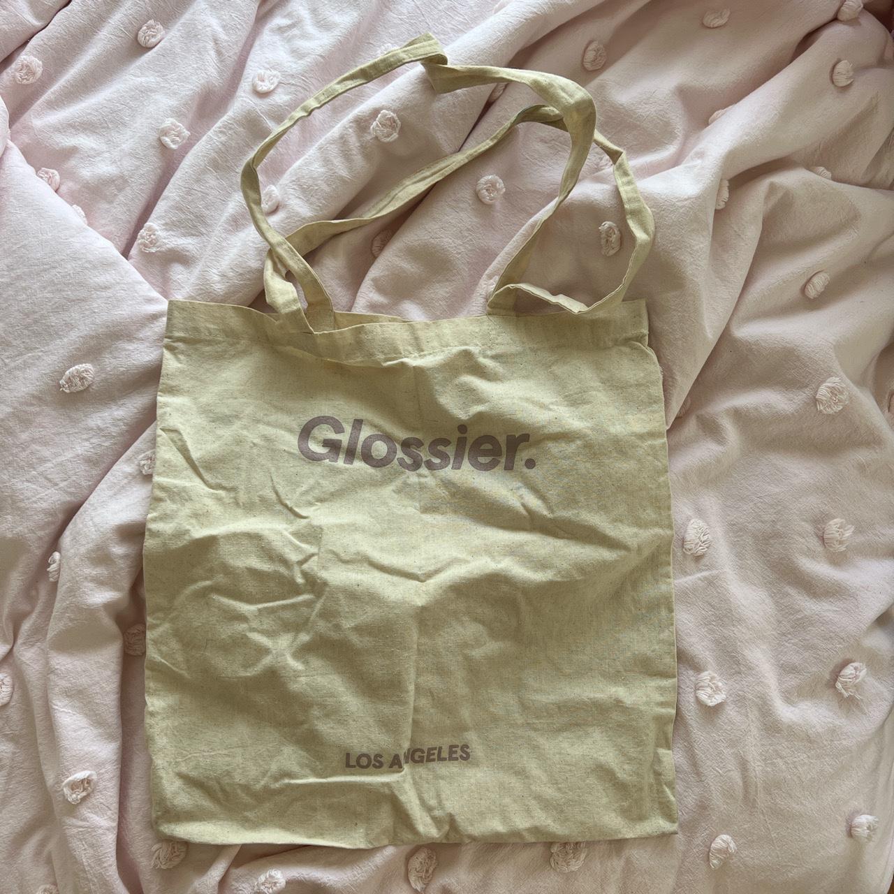 Glossier tote bag has green on inside of straps - Depop
