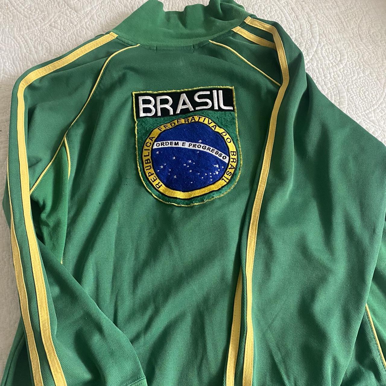 Brasil zip up sweater in perf condition fits like... - Depop