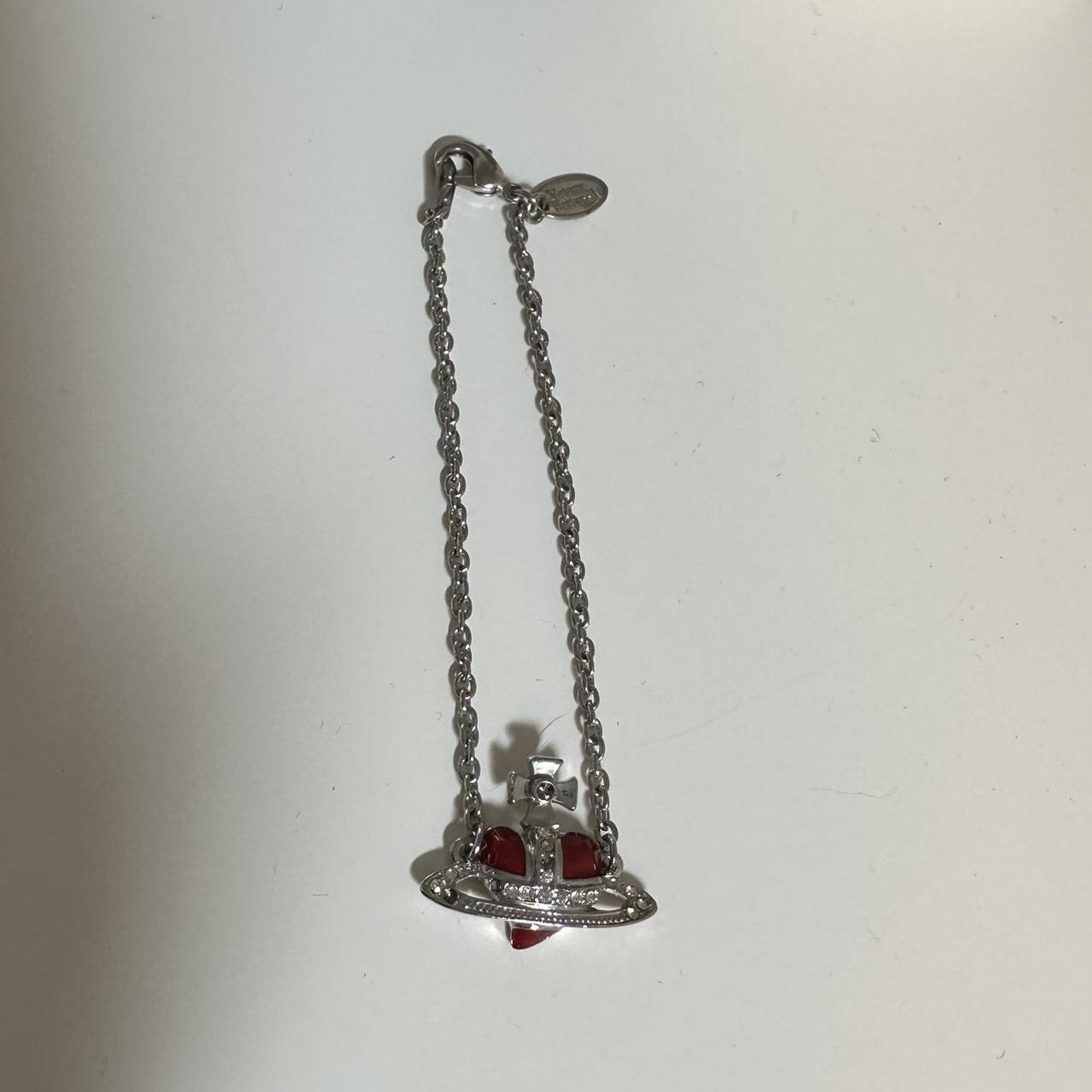 Vivienne Westwood red heart orb pendant... - Depop