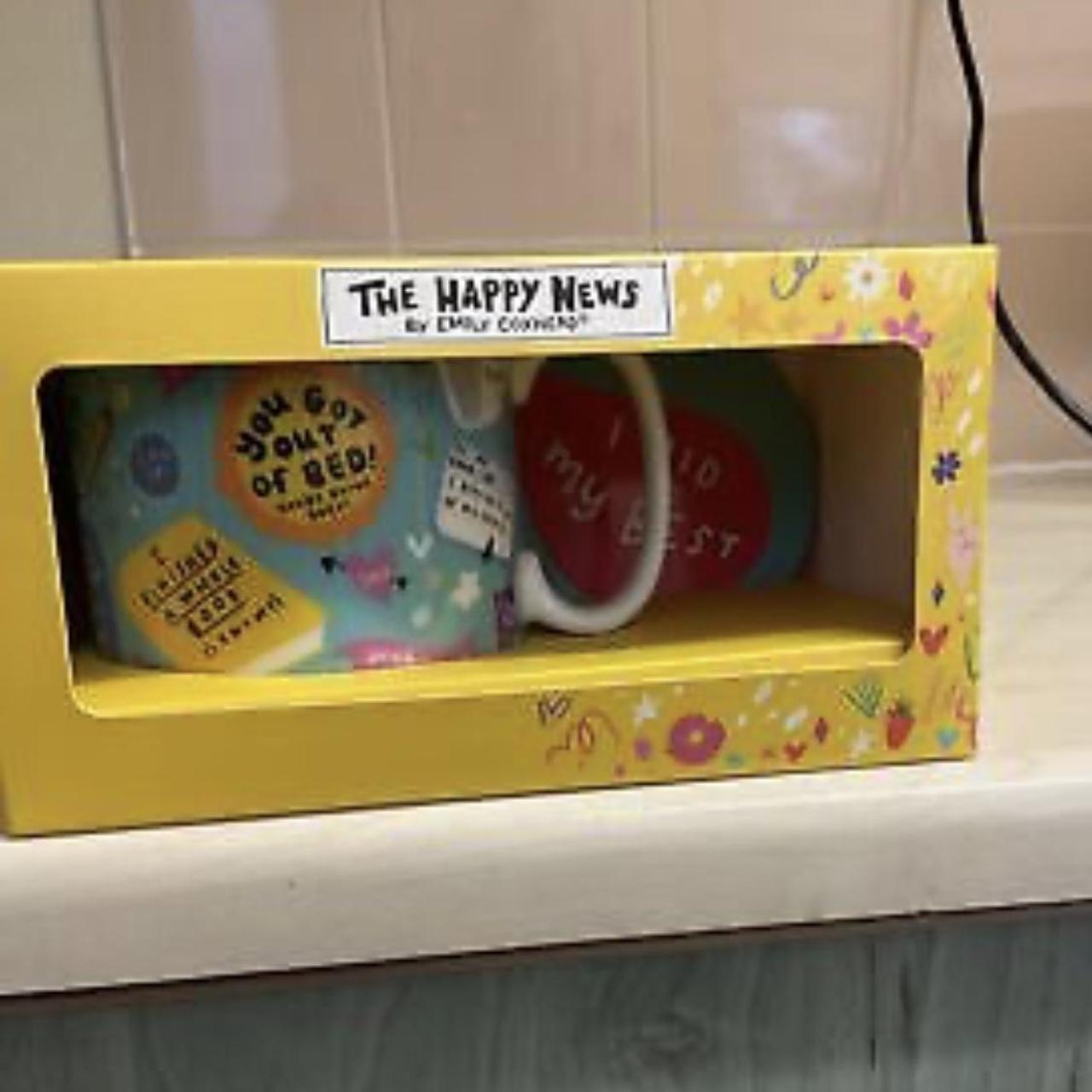 The Happy News by Emily Coxhead Mug & Coaster... - Depop