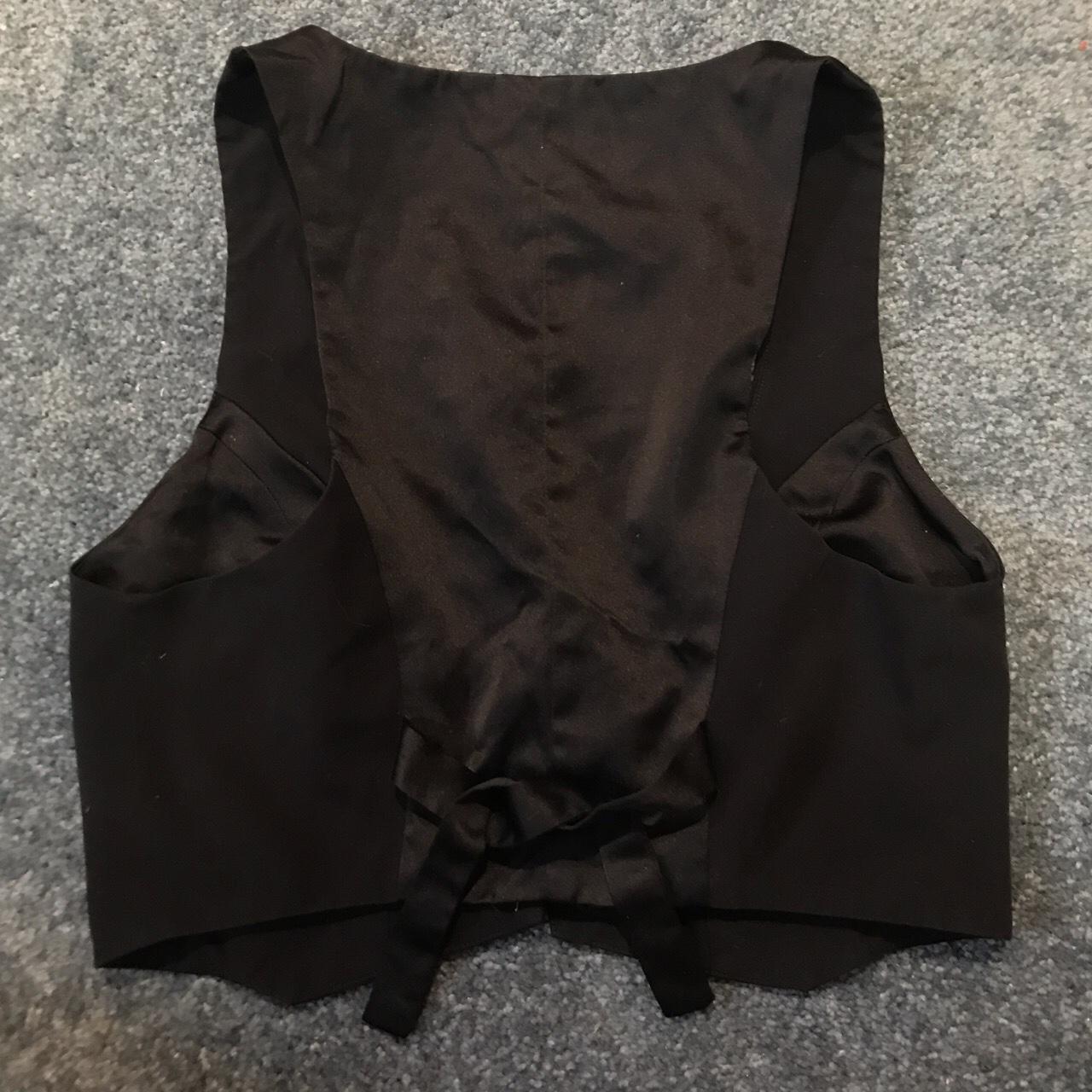 Cute mini button up black vest from Forever21. Size... - Depop