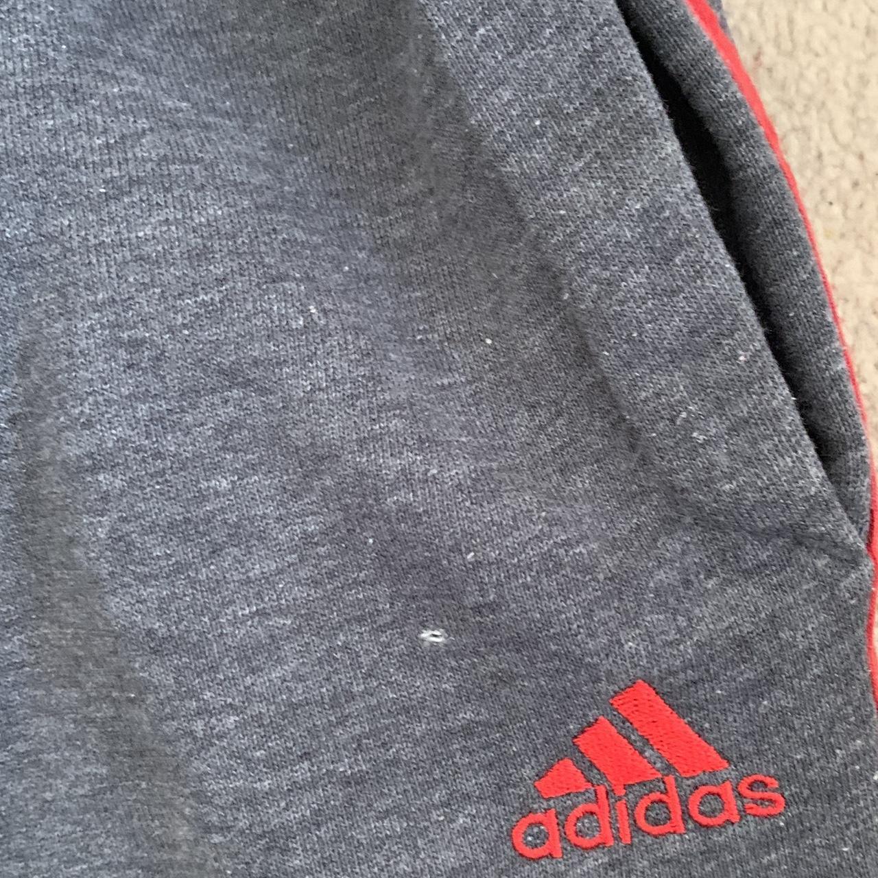low rise adidas cuffed trackies with three red... - Depop