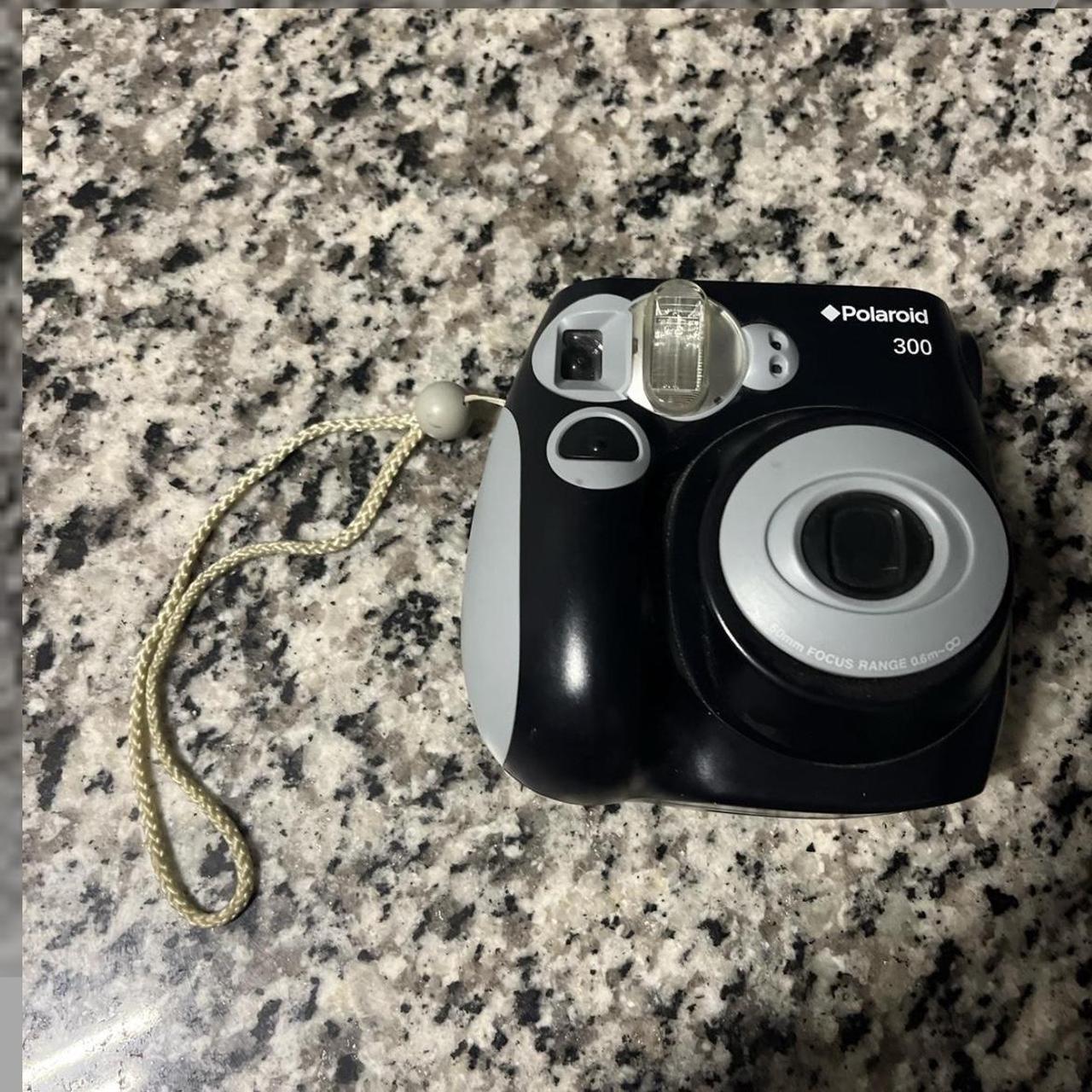 polaroid camera only used once (the string looks... - Depop