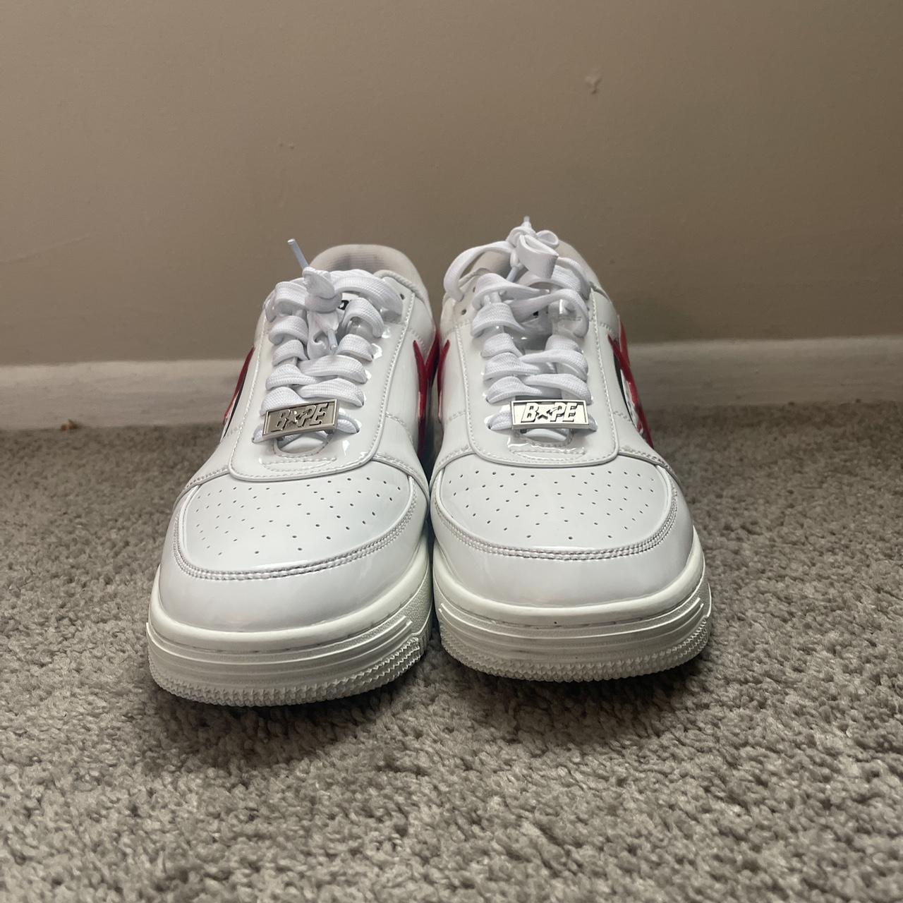 Used white shark bapestas. - Depop